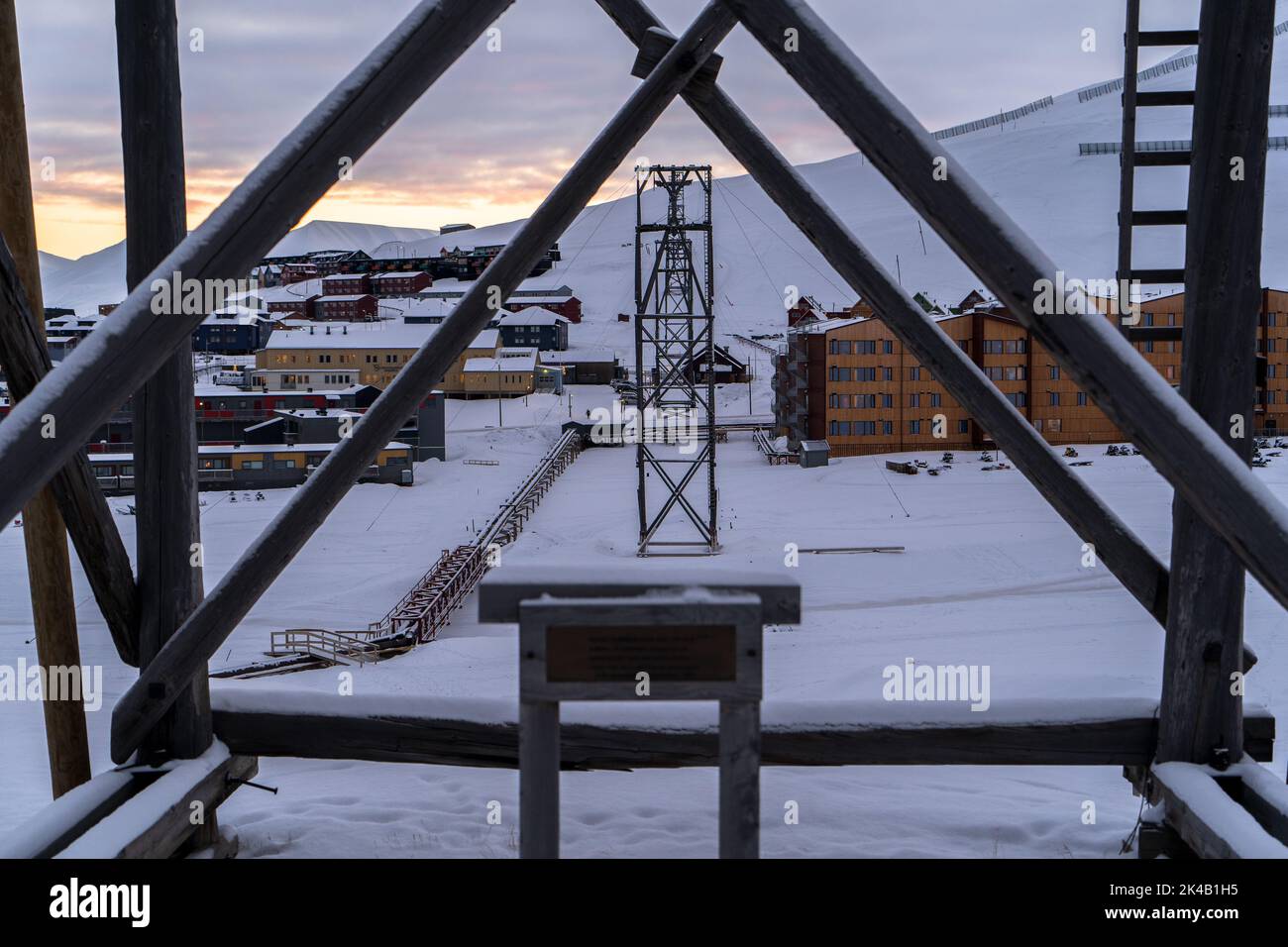 Decommissioned cable car timber structure towers in winter landscape ...