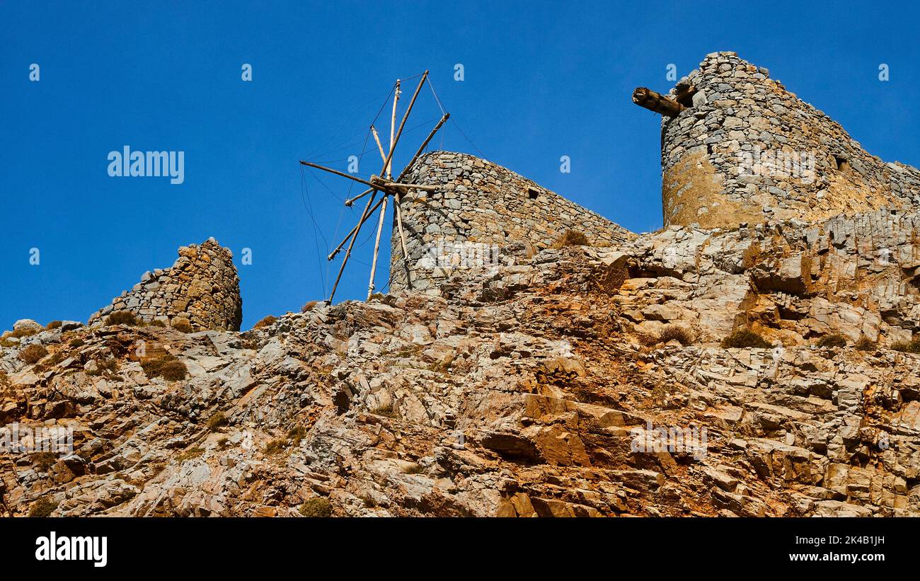 Old windmills, grain mills, Ambelos Pass, blue sky, Lassithi Plateau ...