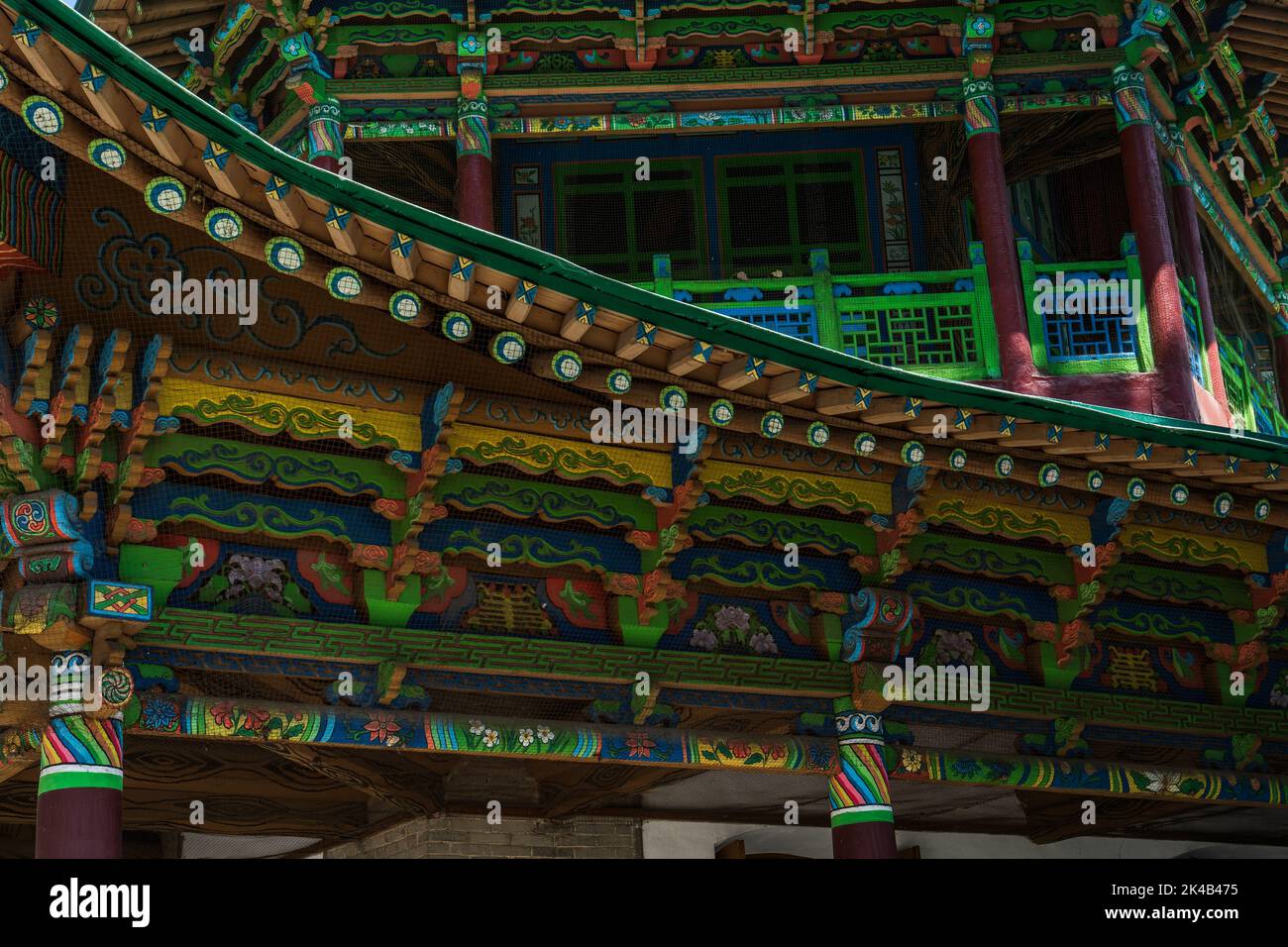 Colourful timber exterior structure and pagoda of Chinese Dungan Uyghur ...