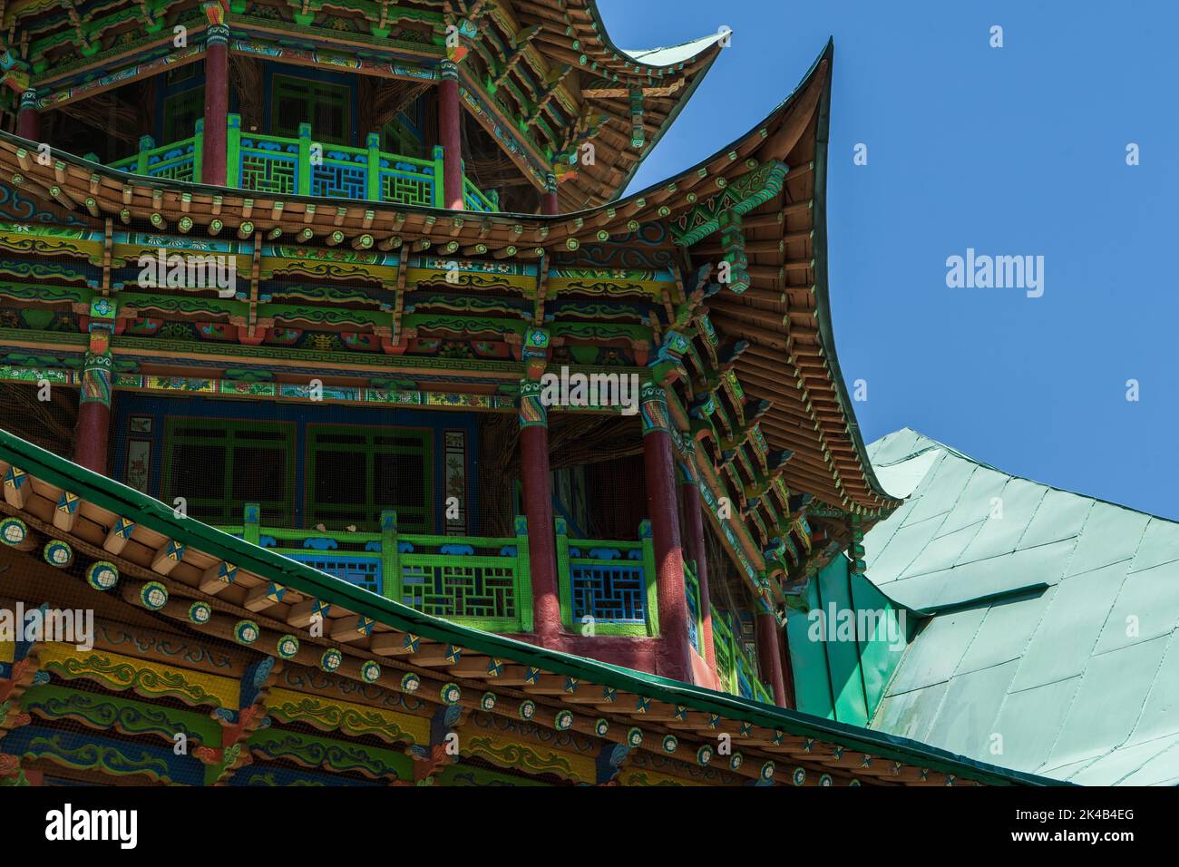 Colourful timber exterior structure and pagoda of Chinese Dungan Uyghur ...