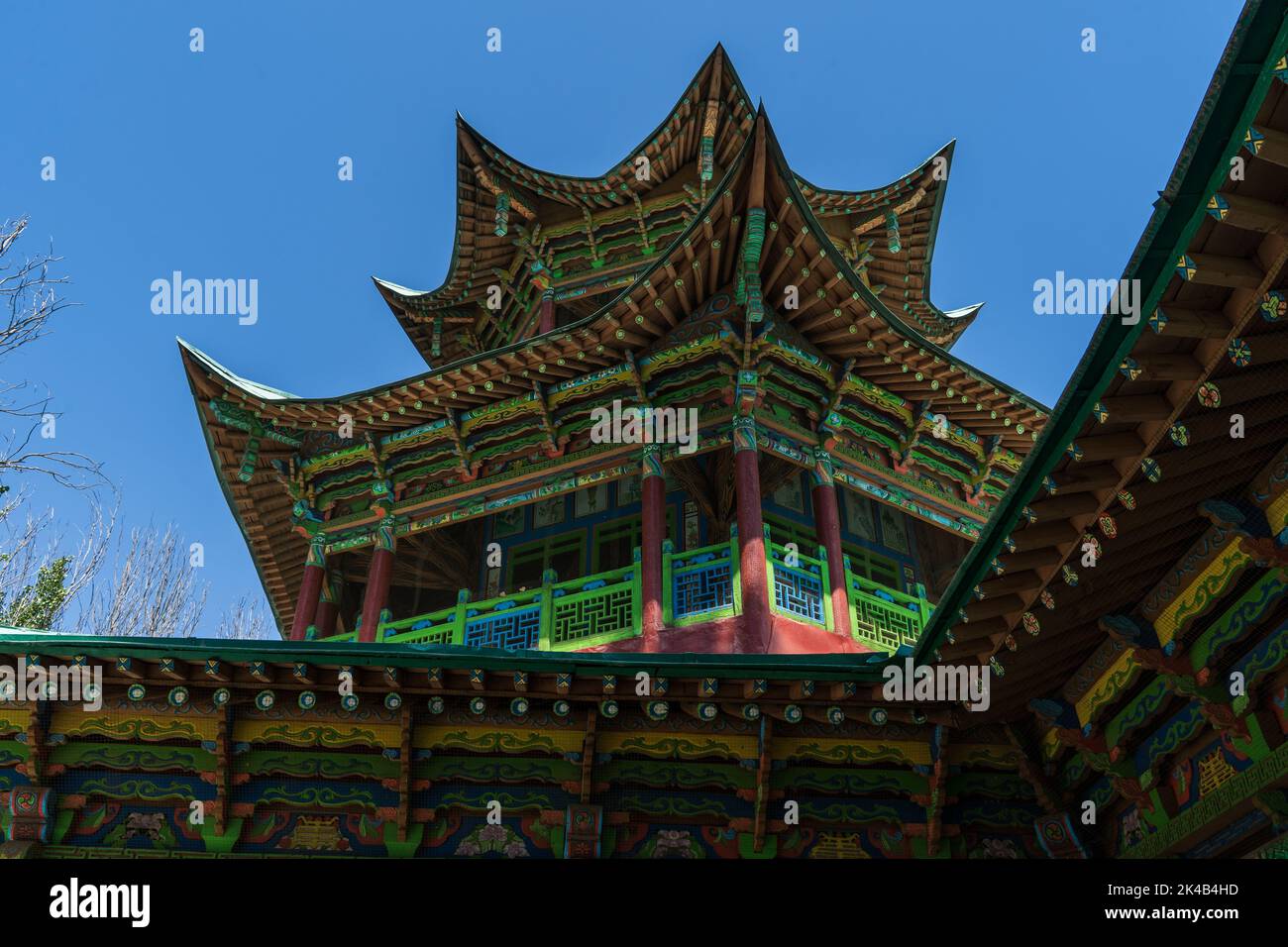 Colourful timber exterior structure and pagoda of Chinese Dungan Uyghur ...