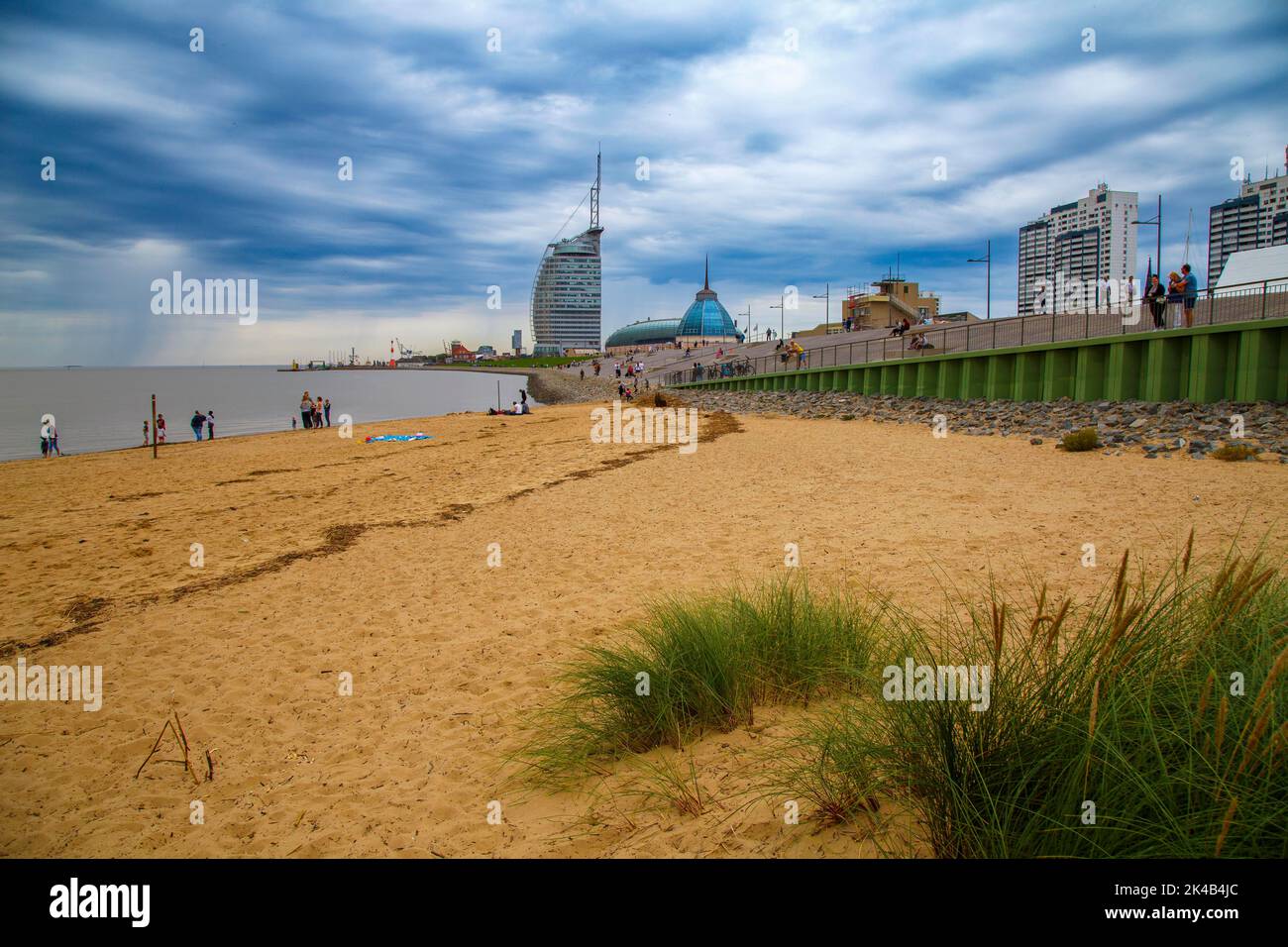 View of the Klimahaus and Atlantic Hotel Sail City from the sand of the ...