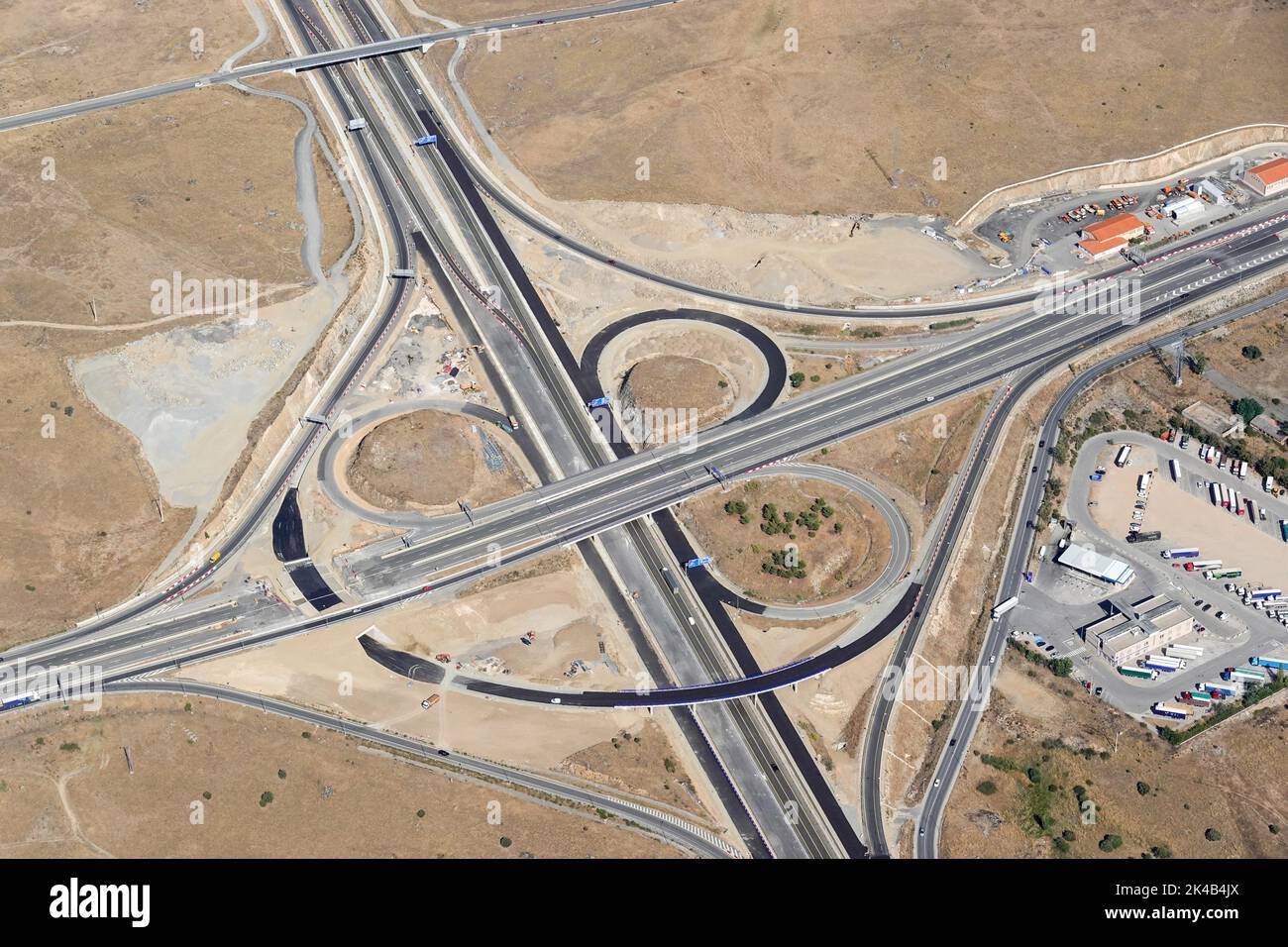 Aerial view of new motorway construction, building site, Segovia ...