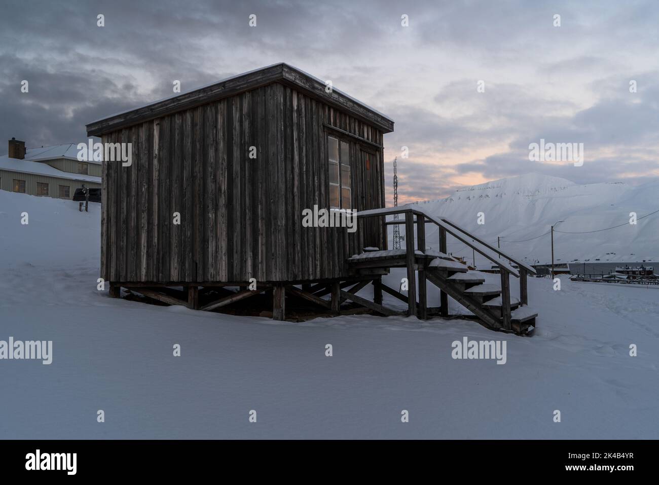 Former post office on cold snowy winter day, Svalbard, Longyearbyen ...