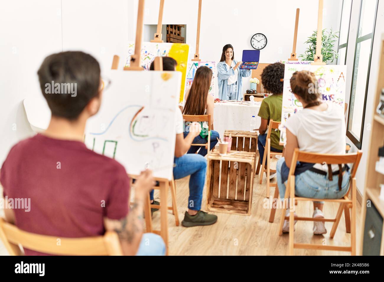 Group of paint students having draw lesson at art studio Stock Photo ...
