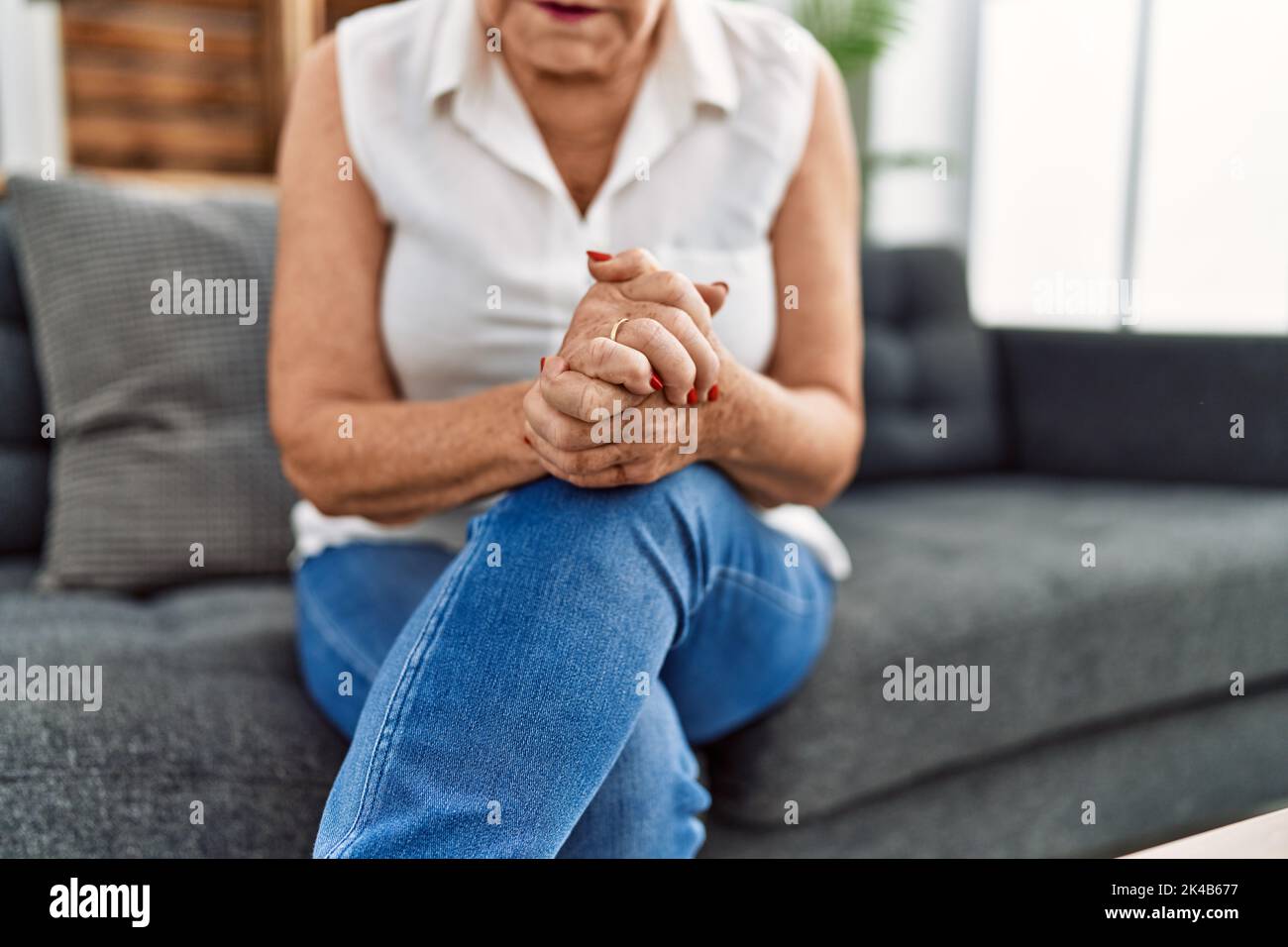 Senior grey-haired woman patient depressed at psychology center Stock ...