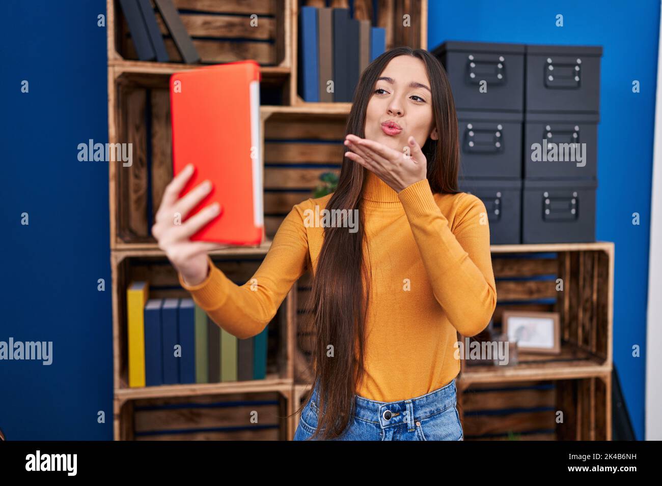 Young beautiful hispanic woman smiling confident having video call at ...