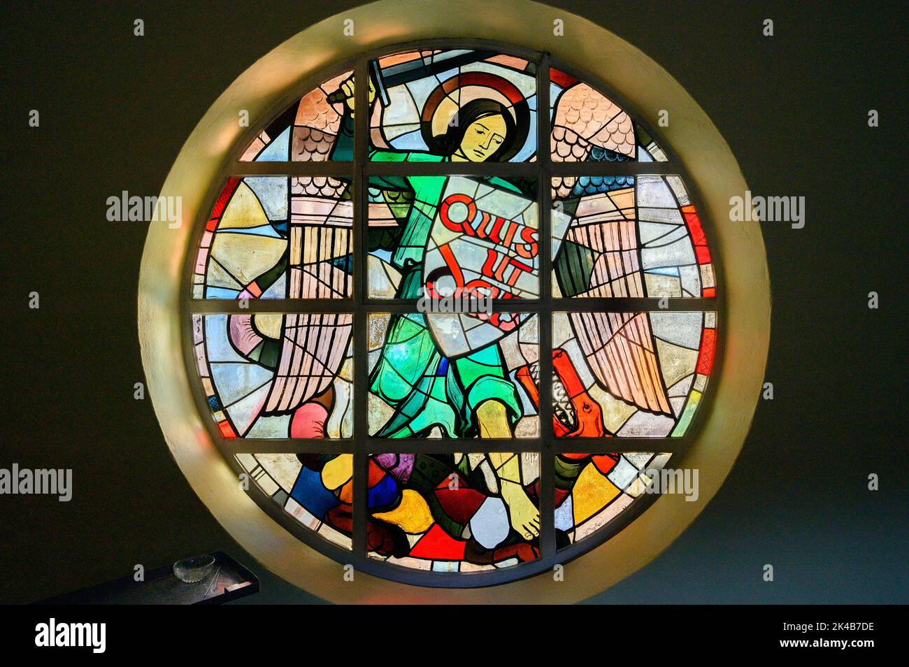 Colourful stained glass window with dragon slayer, modern church, St ...