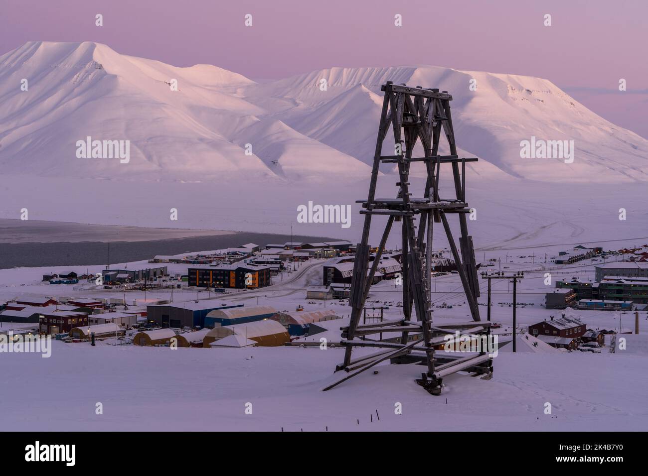 Abandoned decommissioned coal mining industry cable car tower in snowy ...