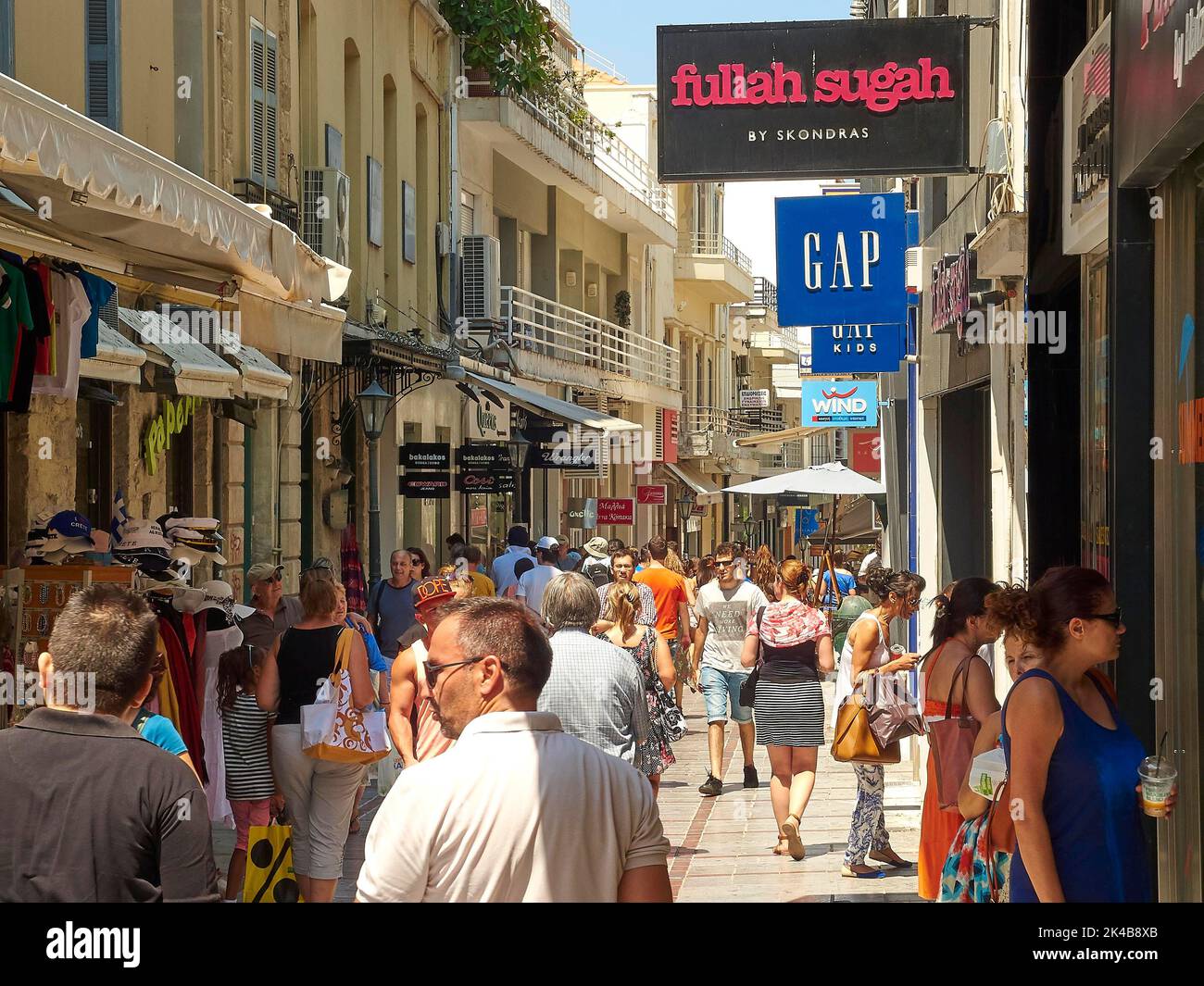 City centre, old town, pedestrian zone, many passers-by, shops, signs ...