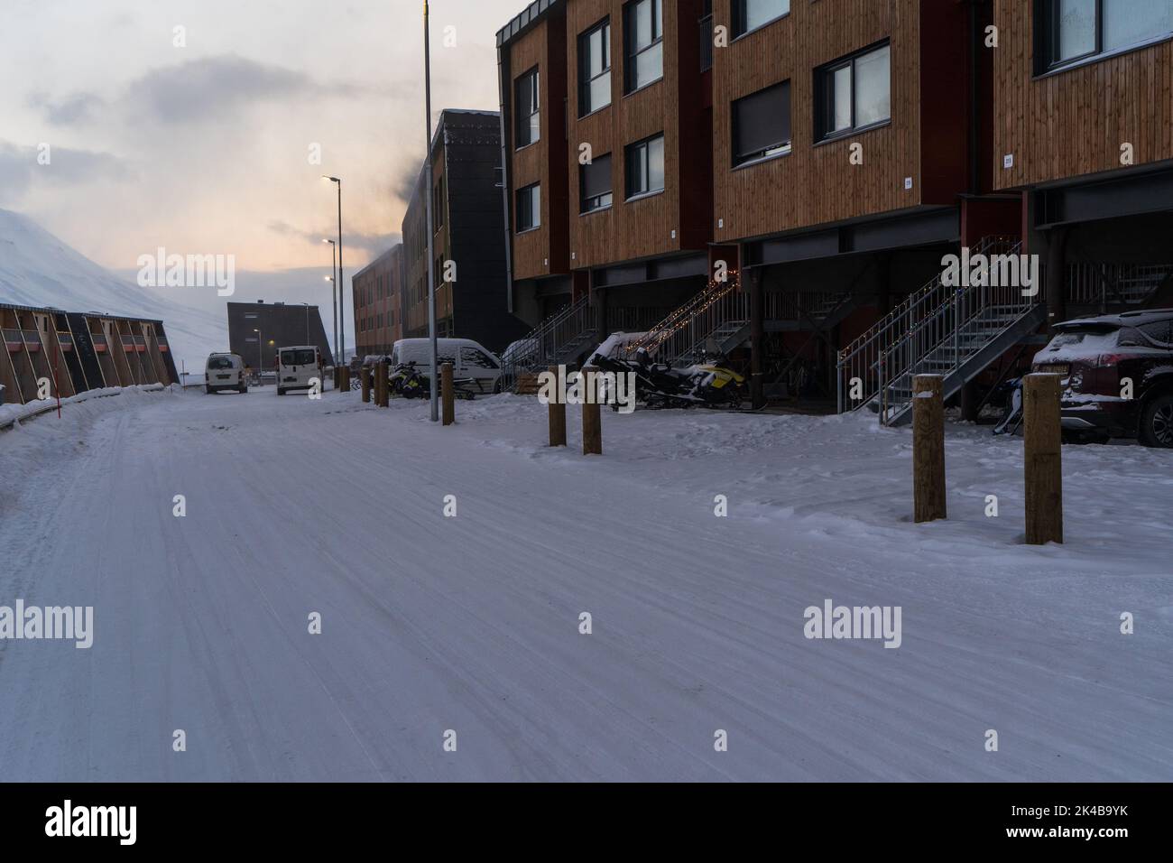 Residential buildings on stilts on a cold winter day in Longyearbyen ...