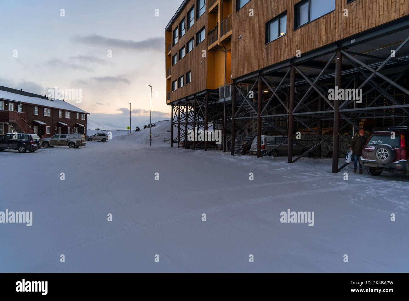 Residential buildings on stilts on a cold winter day in Longyearbyen ...