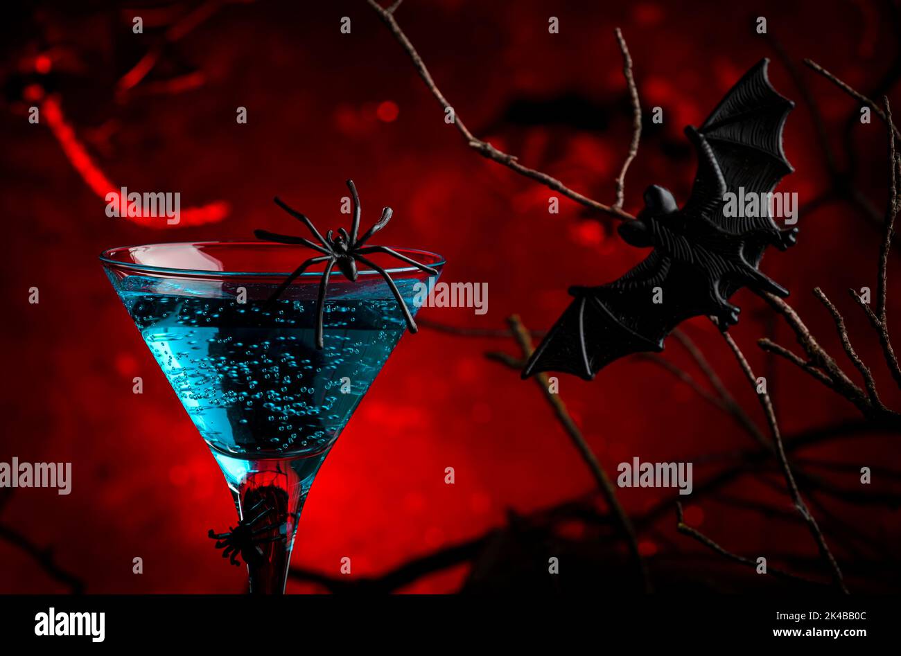 Halloween witch potion alcoholic cocktail on scary dark red background ...