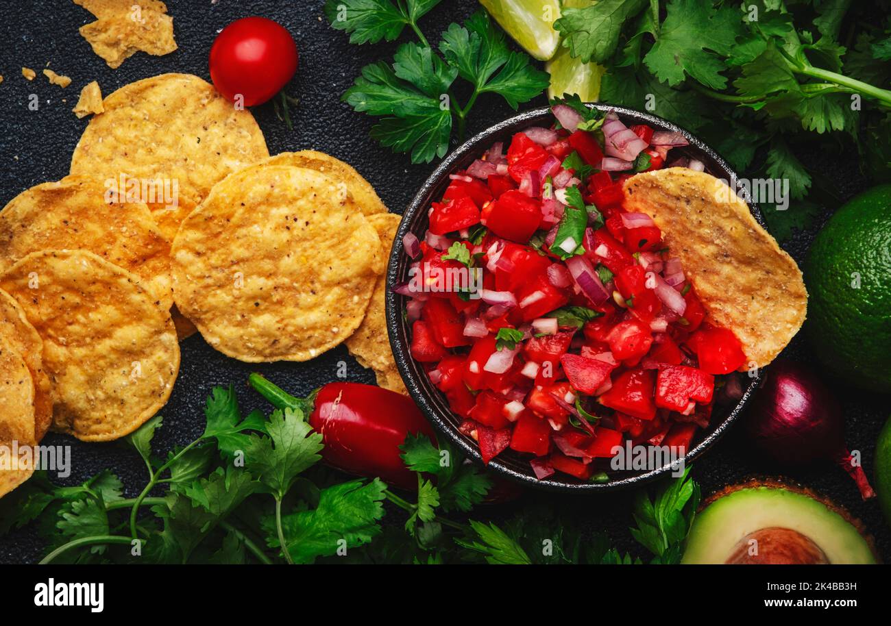 Mexican food. Spicy salsa sauce with tomatoes, chili peppers, onion ...