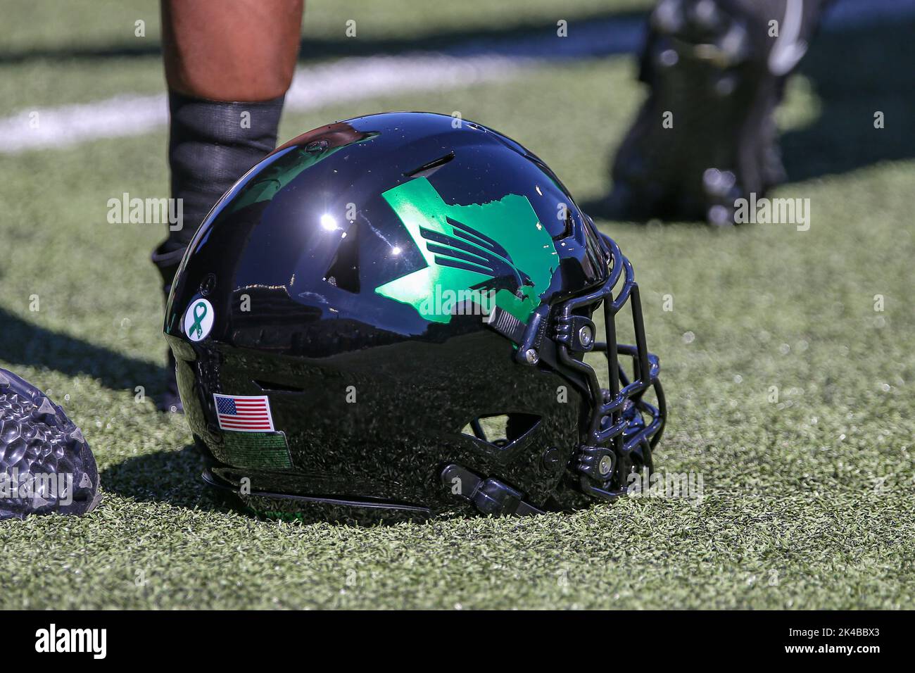 October 01, 2022: North Texas Mean Green alternative helmets worn for ...