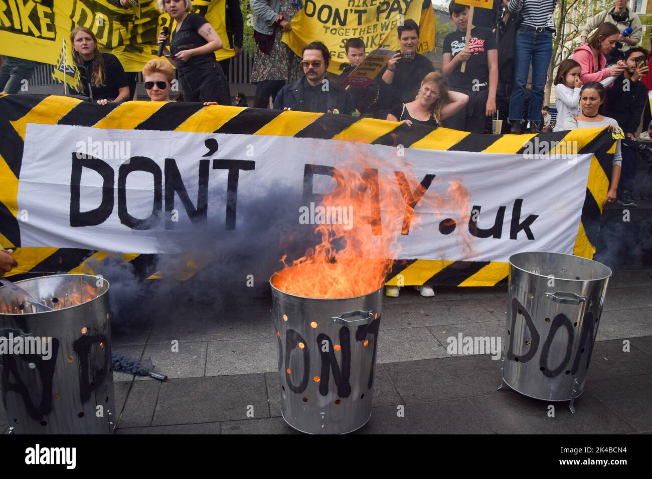 London, UK. 1st October 2022. Protesters burn their energy bills, part ...