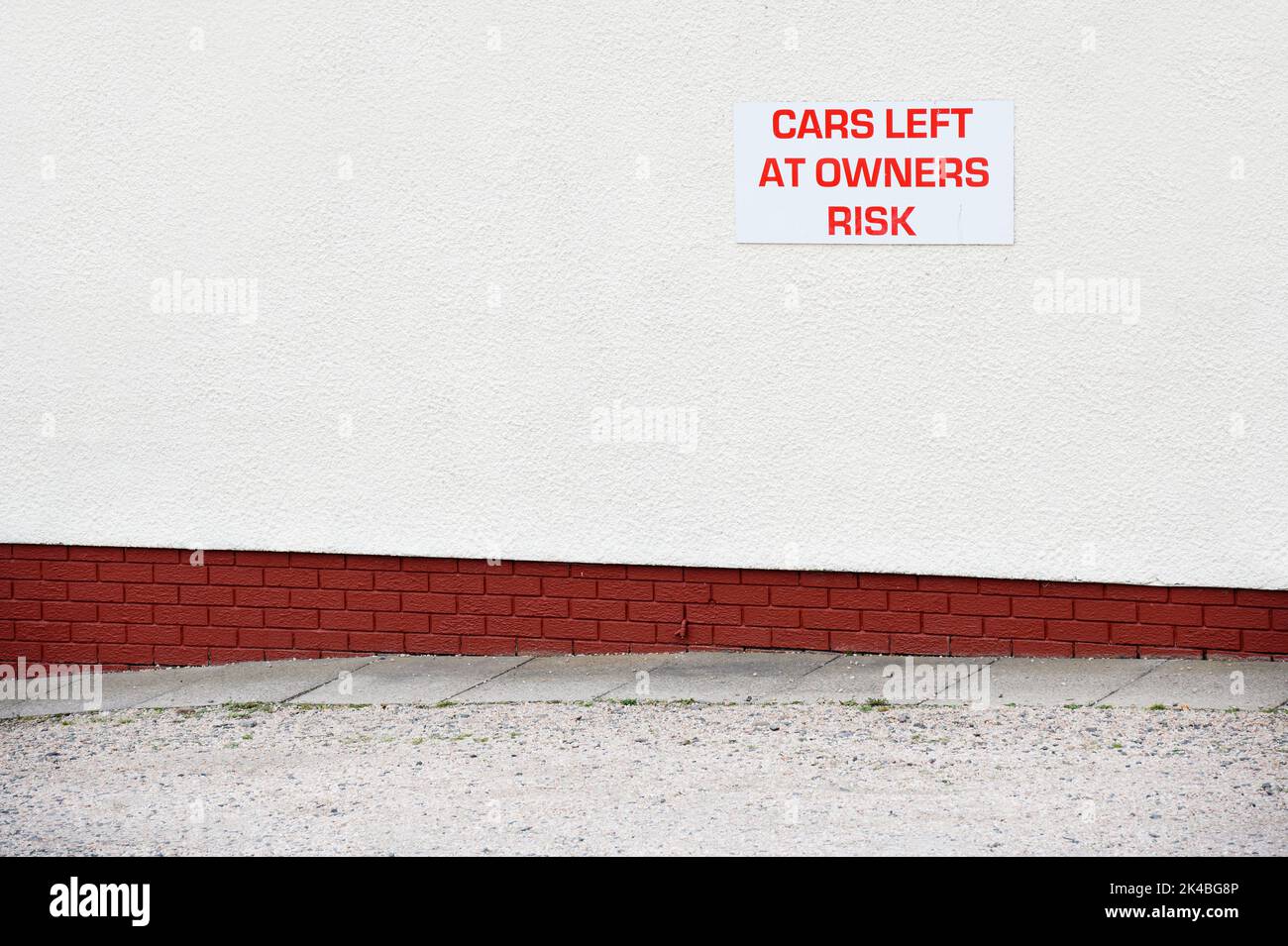 Car park users park here at own risk sign Stock Photo - Alamy Car park users park here at own risk sign Stock Photo - Alamy