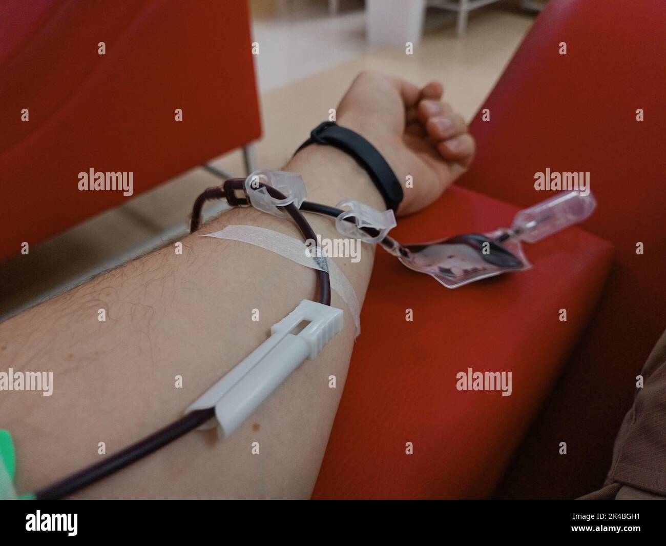 Young person donating blood hi-res stock photography and images - Alamy