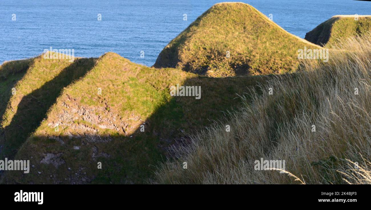 Sea cliffs along the coastal path for Dunottar Castle, Stonehaven ...