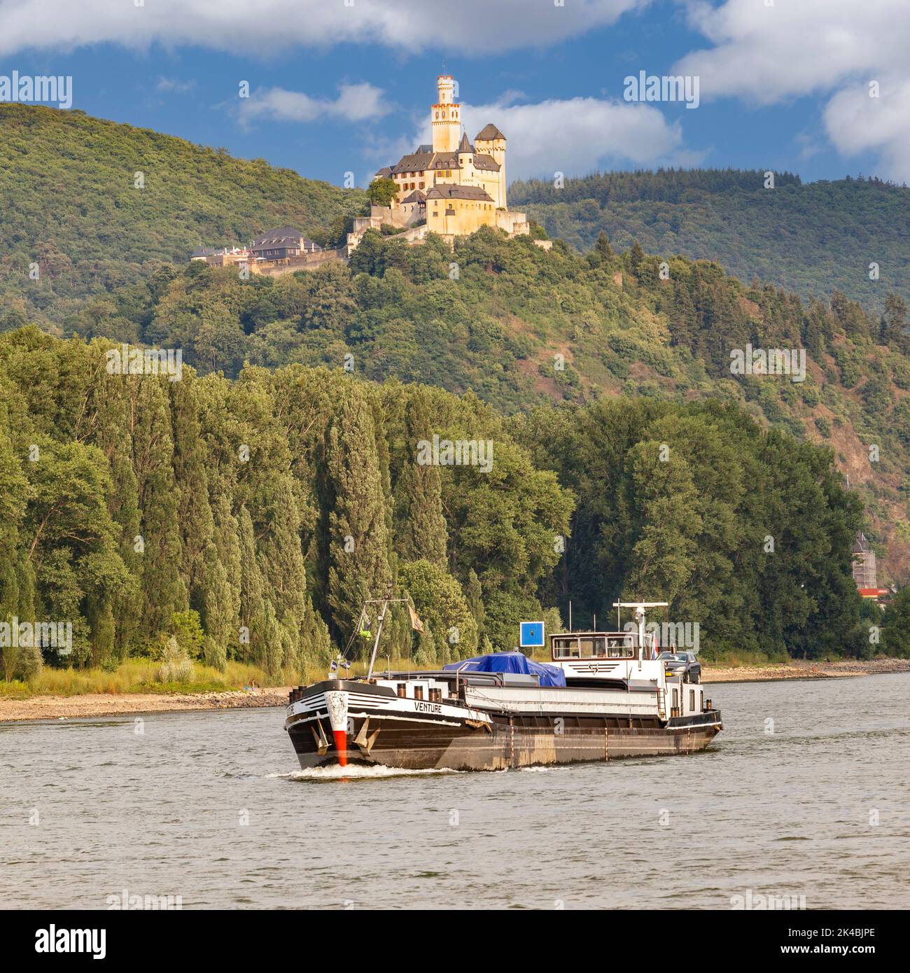 Rhine River Valley, Germany. Light Cargo Boat Passing Marksburg Castle ...