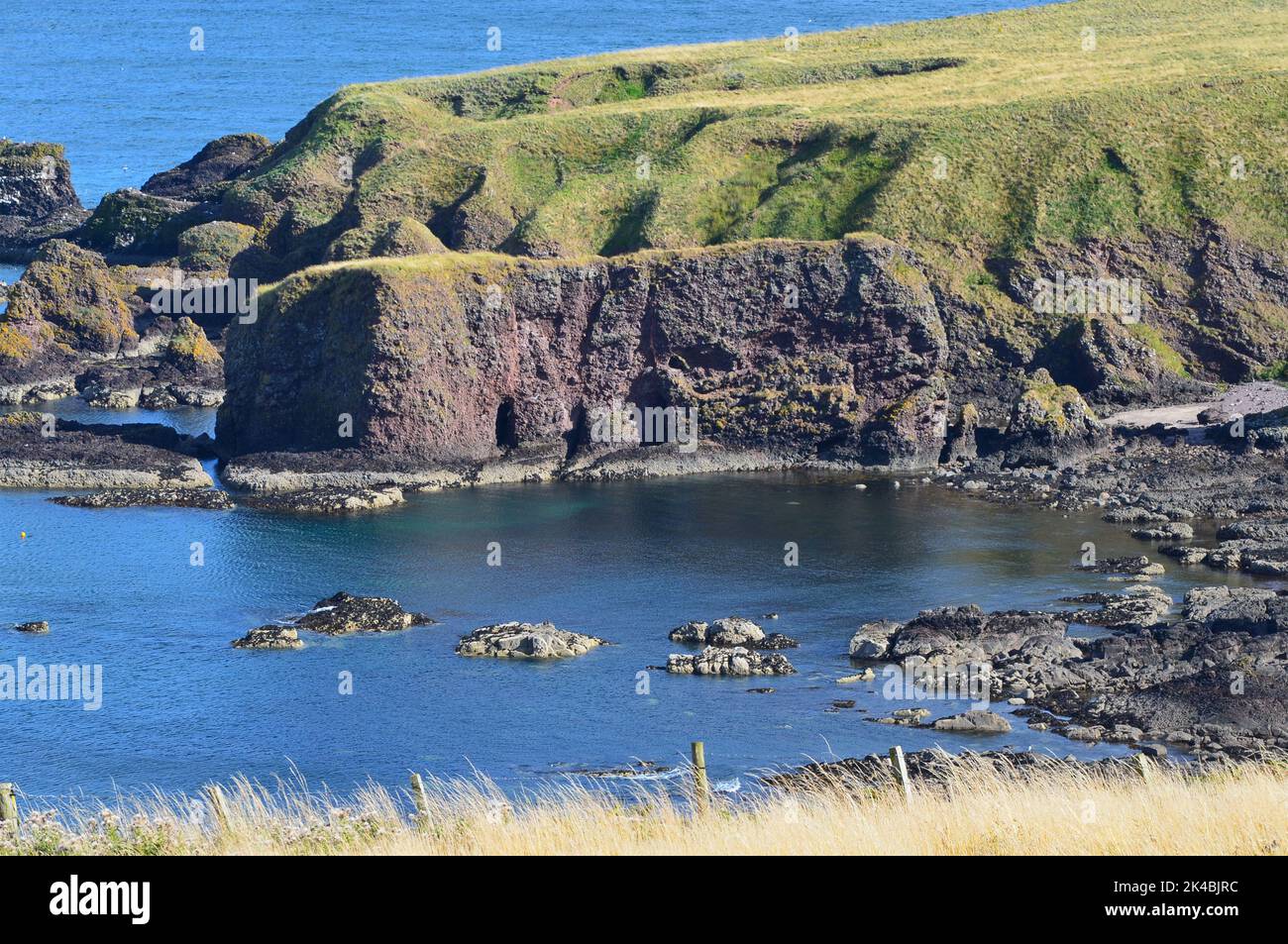 Sea cliffs along the coastal path for Dunottar Castle, Stonehaven ...