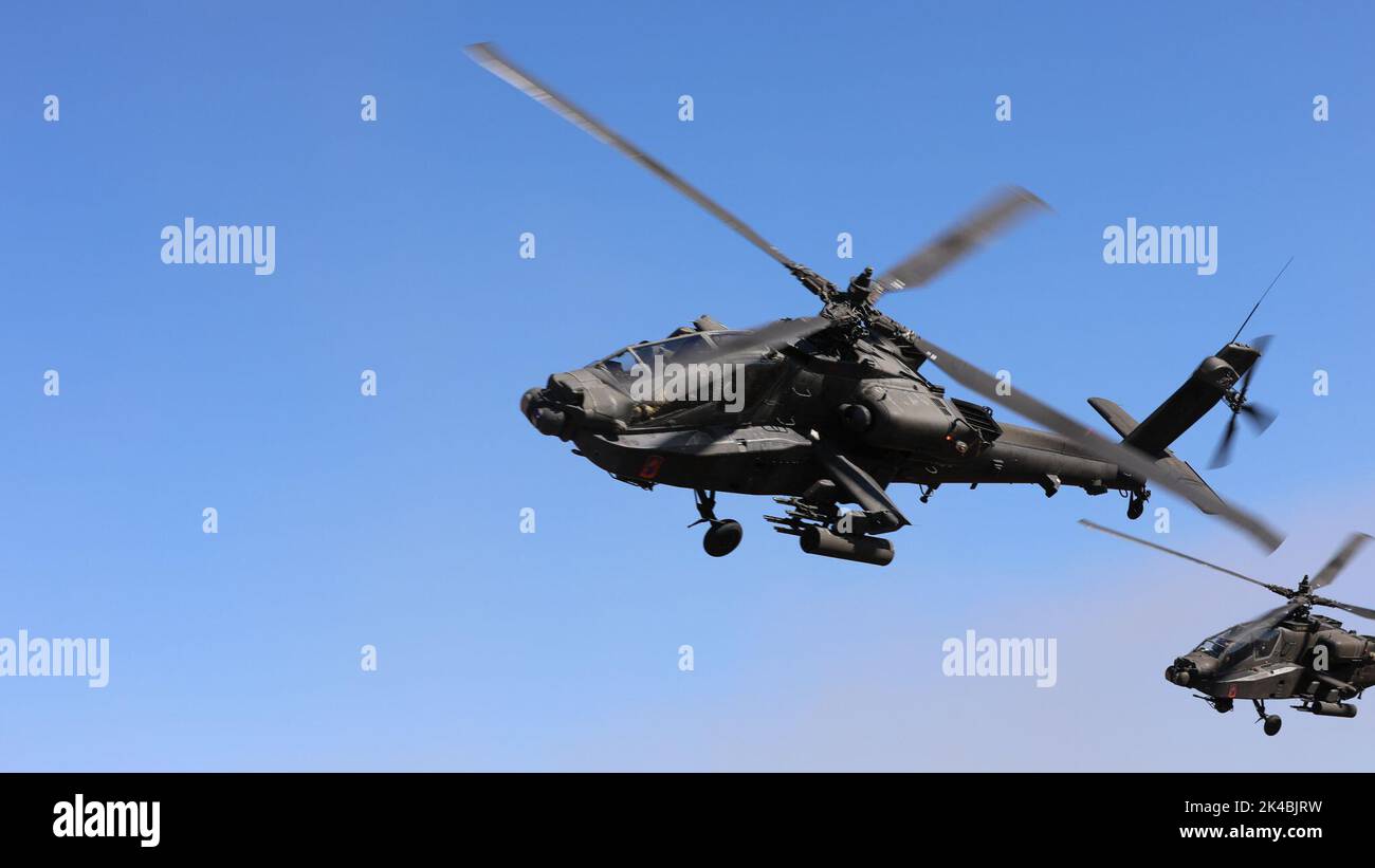 Two AH-64 Apache helicopters with 1st Battalion, 3rd Aviation Regiment ...