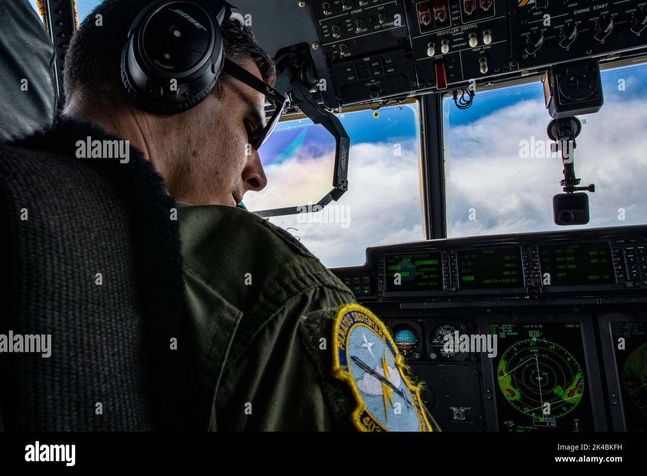 Lt. Col. Dave Gentile, WC-130J aircraft commander, flies a 53rd Weather Reconnaissance aircraft ...