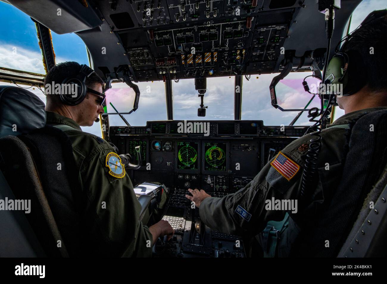 Lt. Col. Dave Gentile, WC-130J aircraft commander, and Maj. Alex Boykin ...
