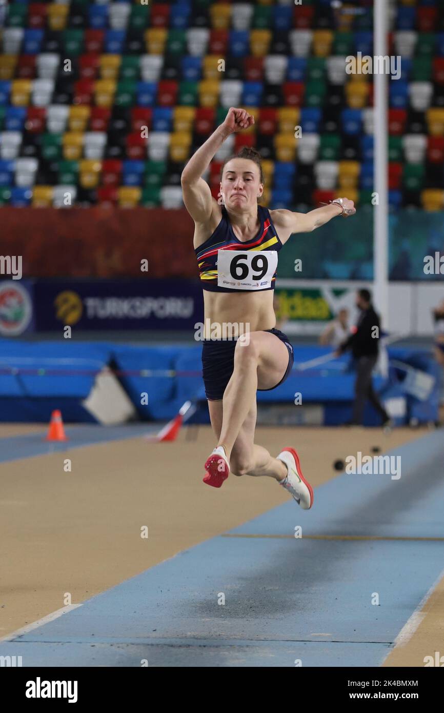 ISTANBUL, TURKEY - MARCH 05, 2022: Andreea Talos Elena triple jumping ...