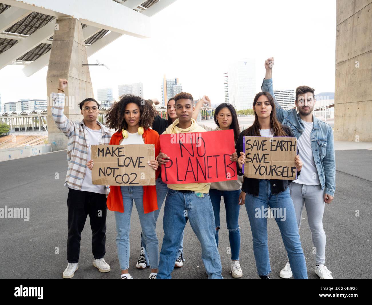 Group of multi-ethnic youth protests with posters in defense of the ...