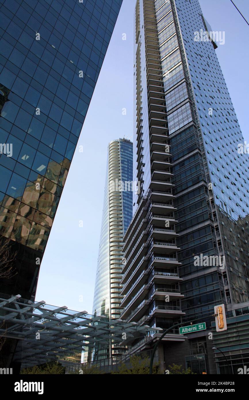 High skyscraper building with reflecting glass facade in downtown ...