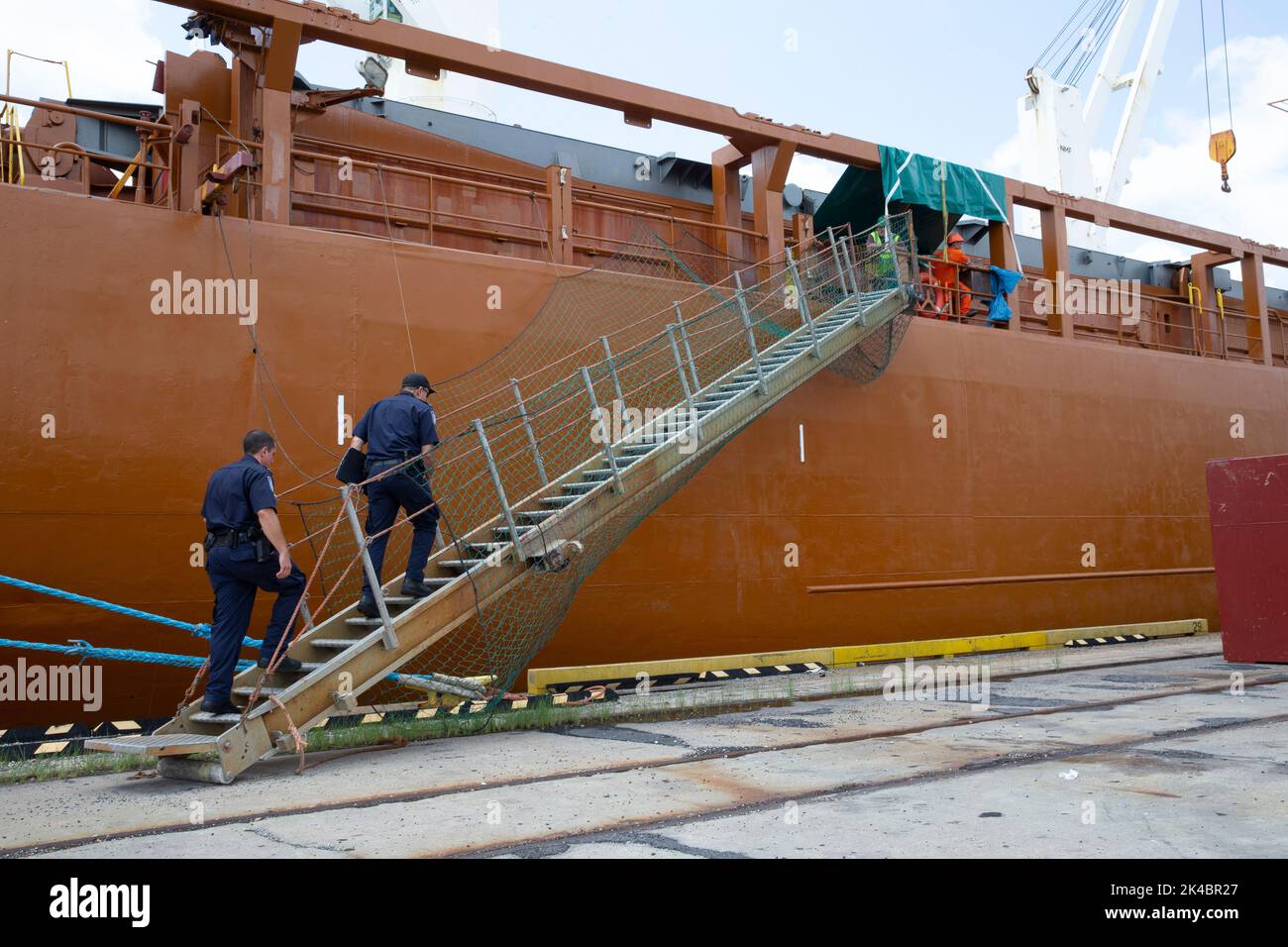CBP Officers and an Agriculture Specialist board a container ship at ...