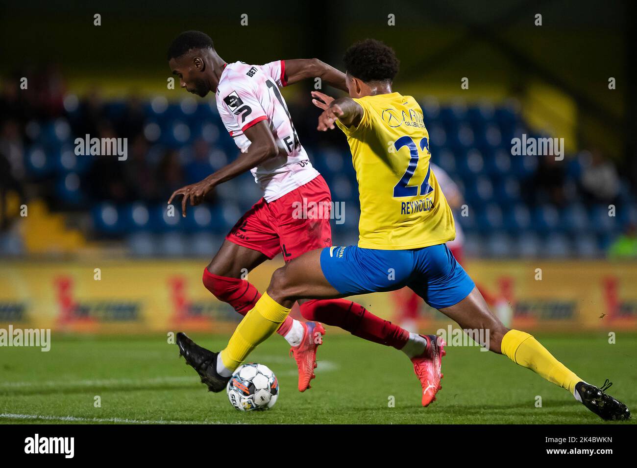 Essevee's Alieu Fadera and Westerlo's Bryan Reynolds pictured in action ...