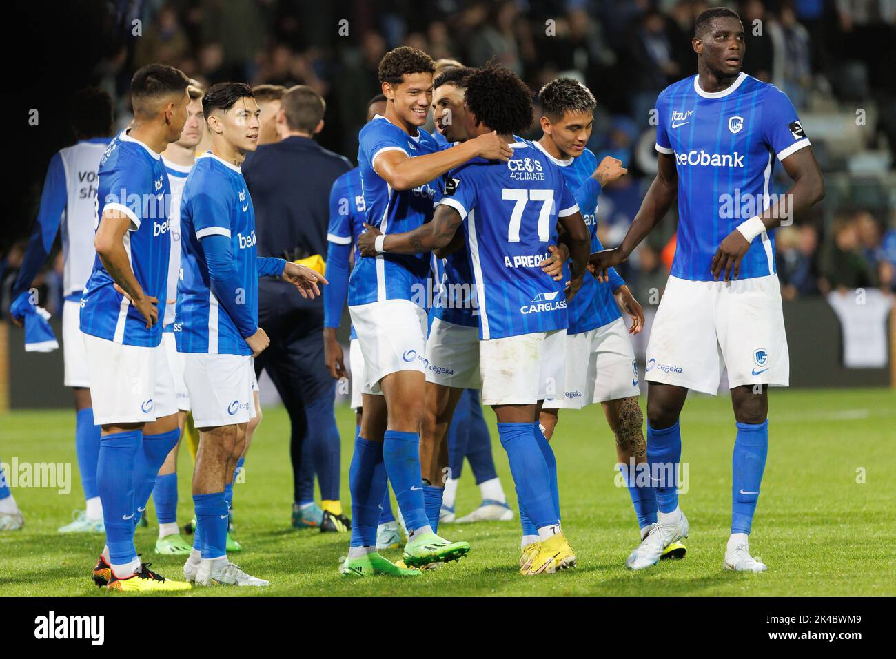 Genk's players celebrate after winning a soccer match between KV ...