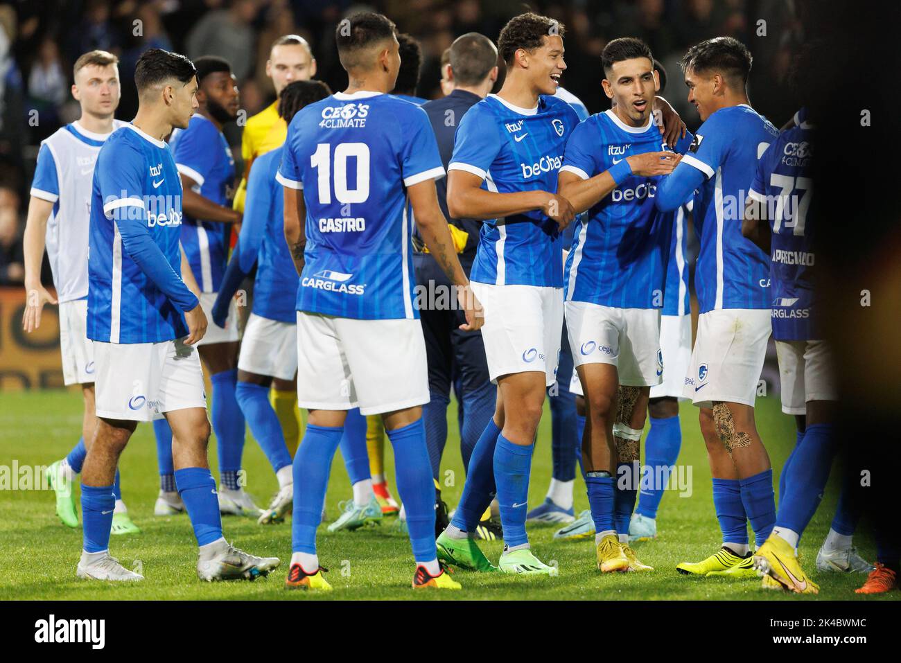 Genk's players celebrate after winning a soccer match between KV ...