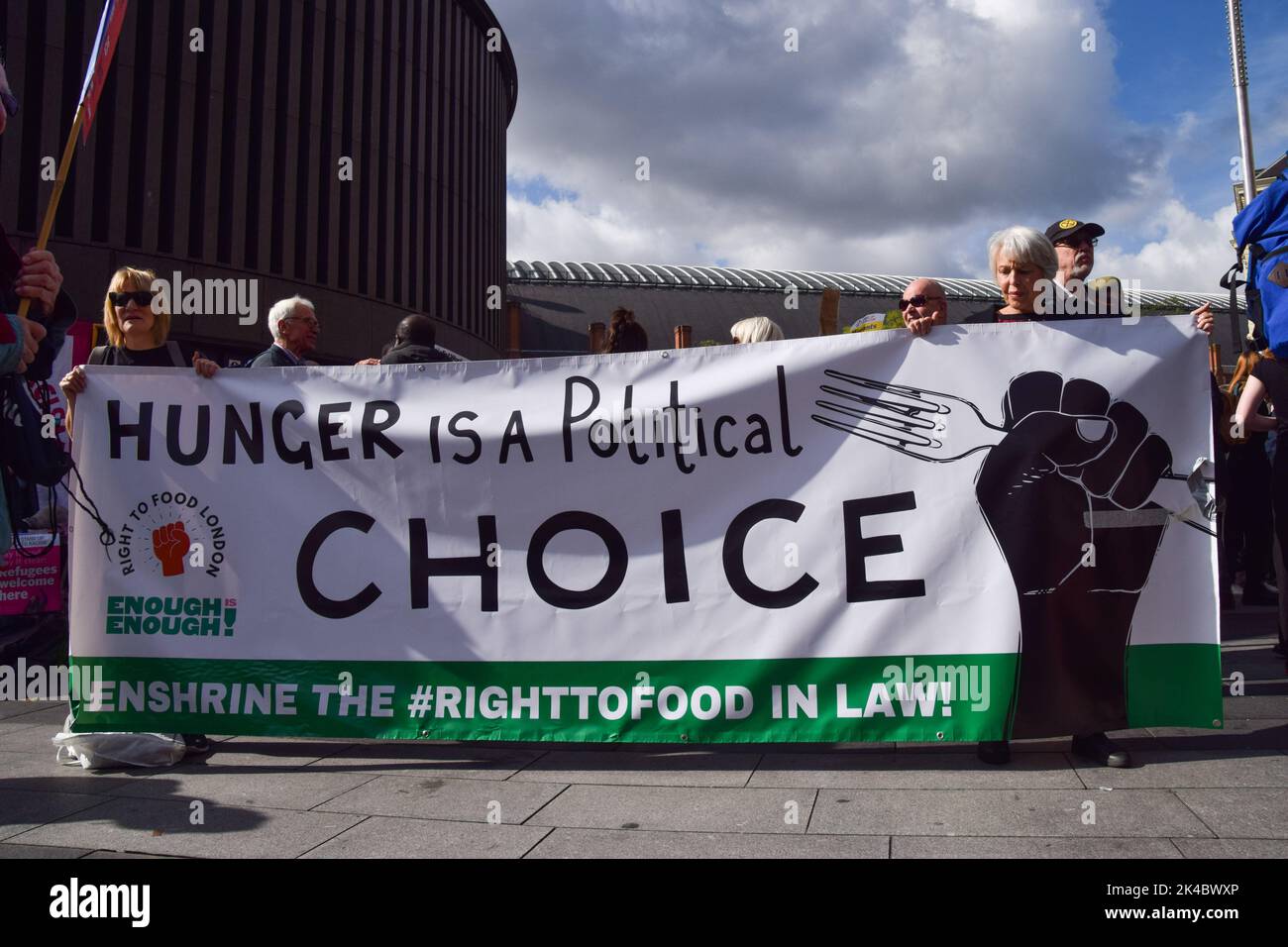 London, England, UK. 1st Oct, 2022. Protesters hold a banner which ...