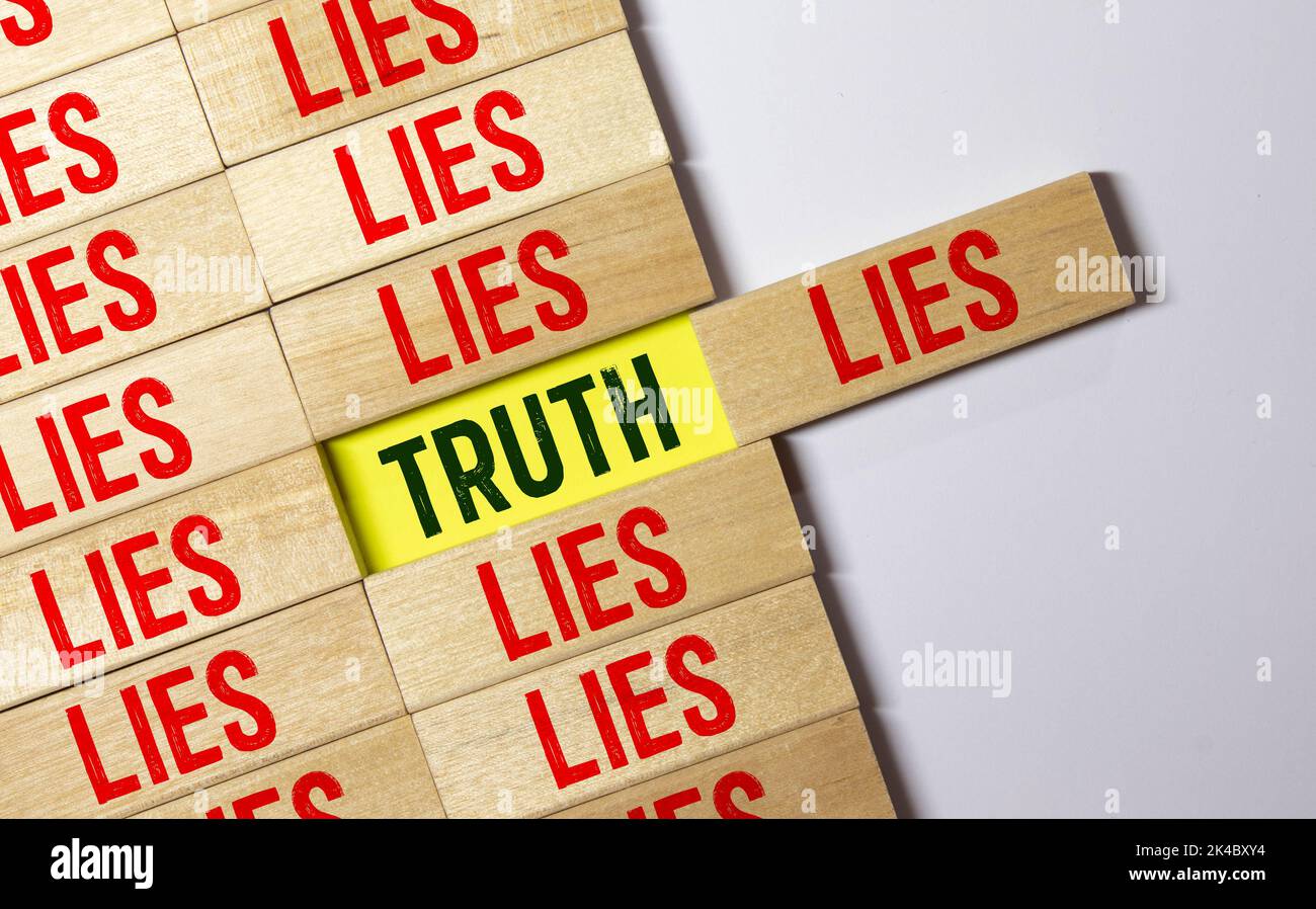 Word lies and truth on wooden block, concept Stock Photo - Alamy