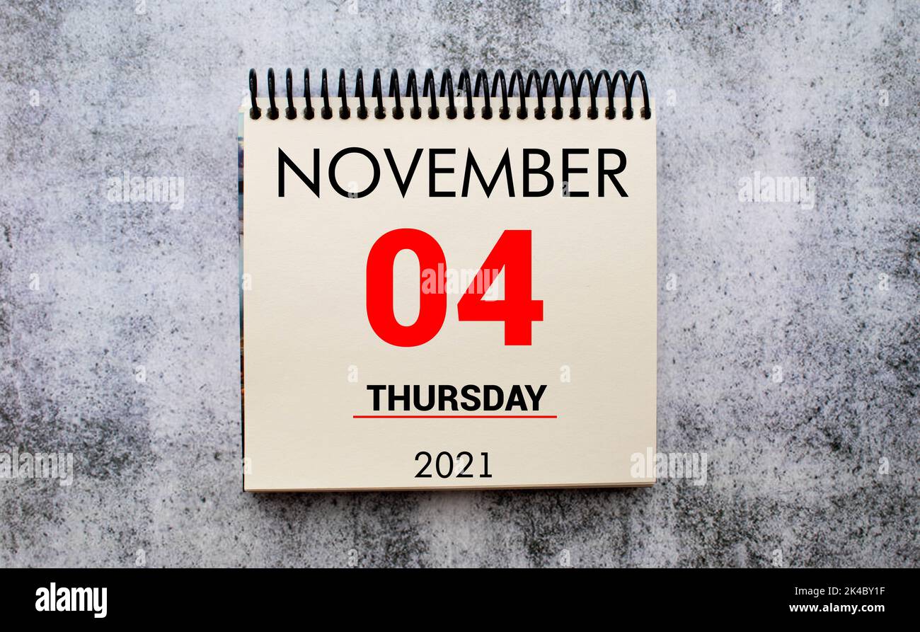 November 4th. Day 4 of month, color sticker calendar on notice board ...