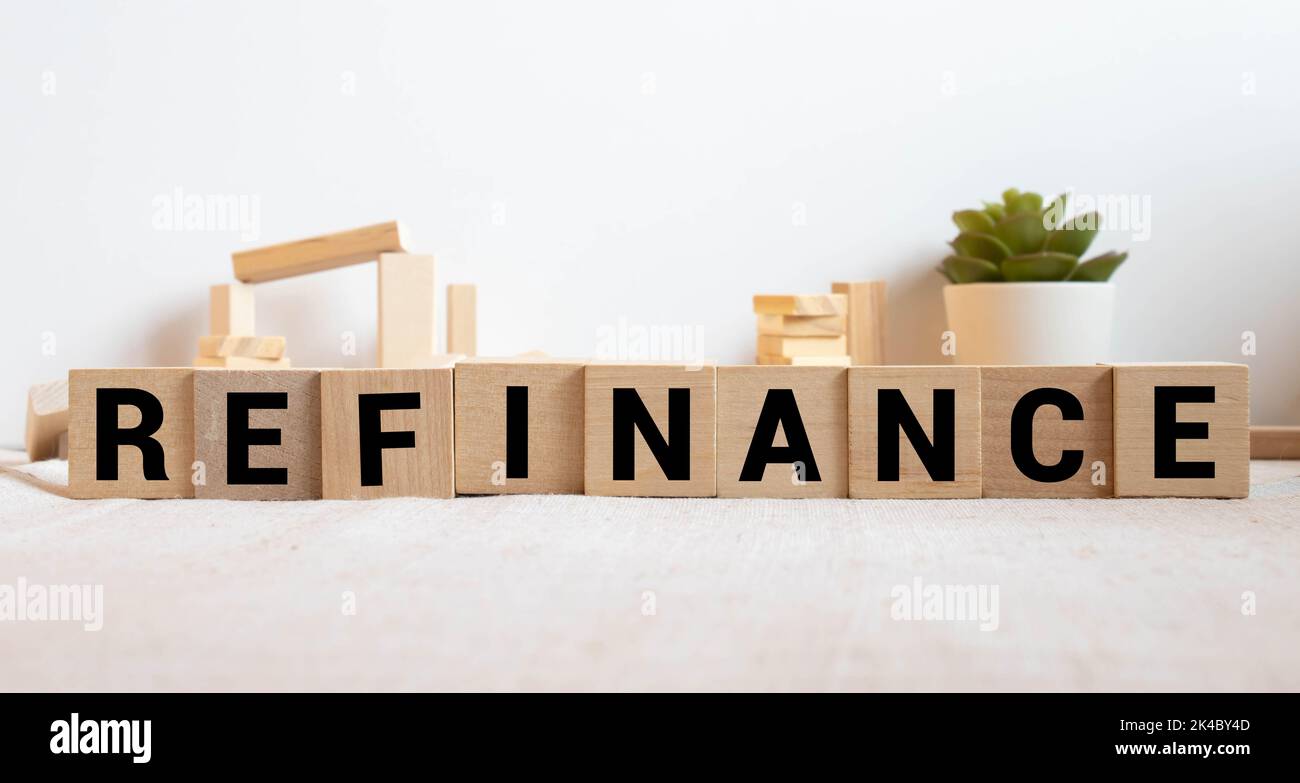 Closeup on notebook over wood table background, focus on wooden blocks ...
