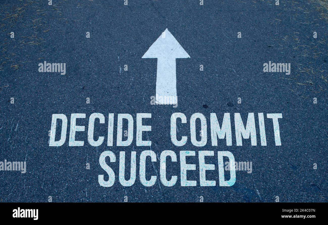 Business concept. On the asphalt road markings an arrow with the ...