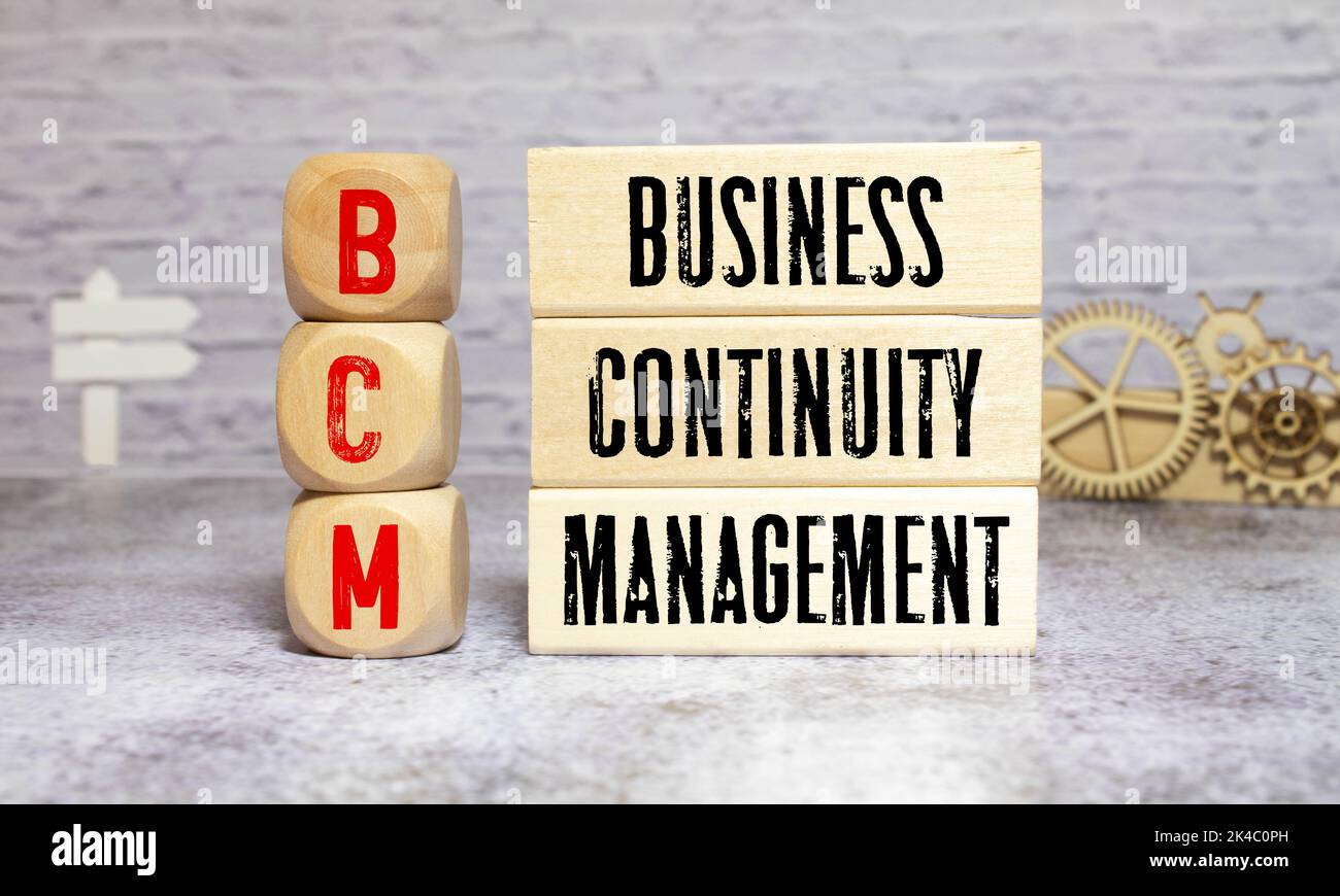 PDSA, plan do study act symbol. Businessman hand. Wooden cubes and ...