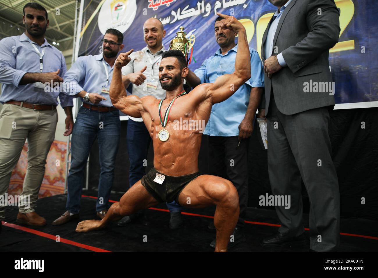 Gaza, Palestine. 1st Oct, 2022. A Palestinian athlete celebrates after ...