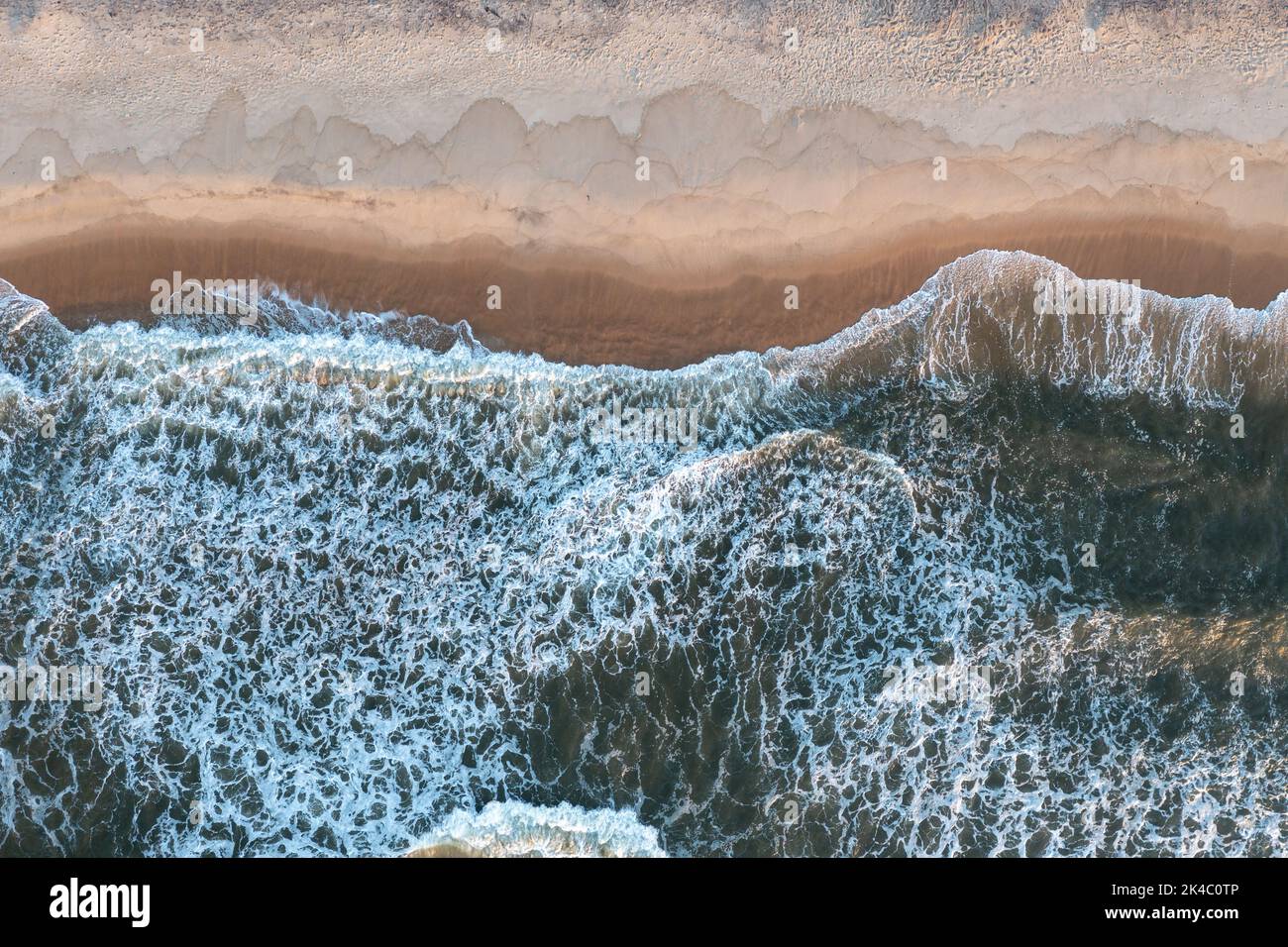 Waves flowing over the sand on the beach of Long Island, New York Stock ...