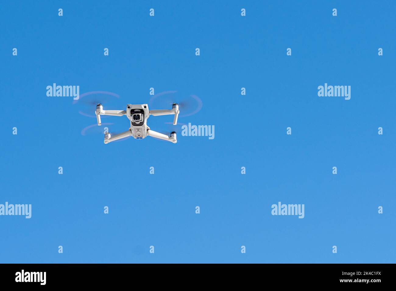 drone front view in flight on clear sky Stock Photo - Alamy