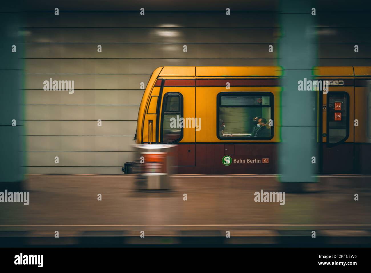 A S-Bahn Berlin DB train arriving at the train station Stock Photo - Alamy