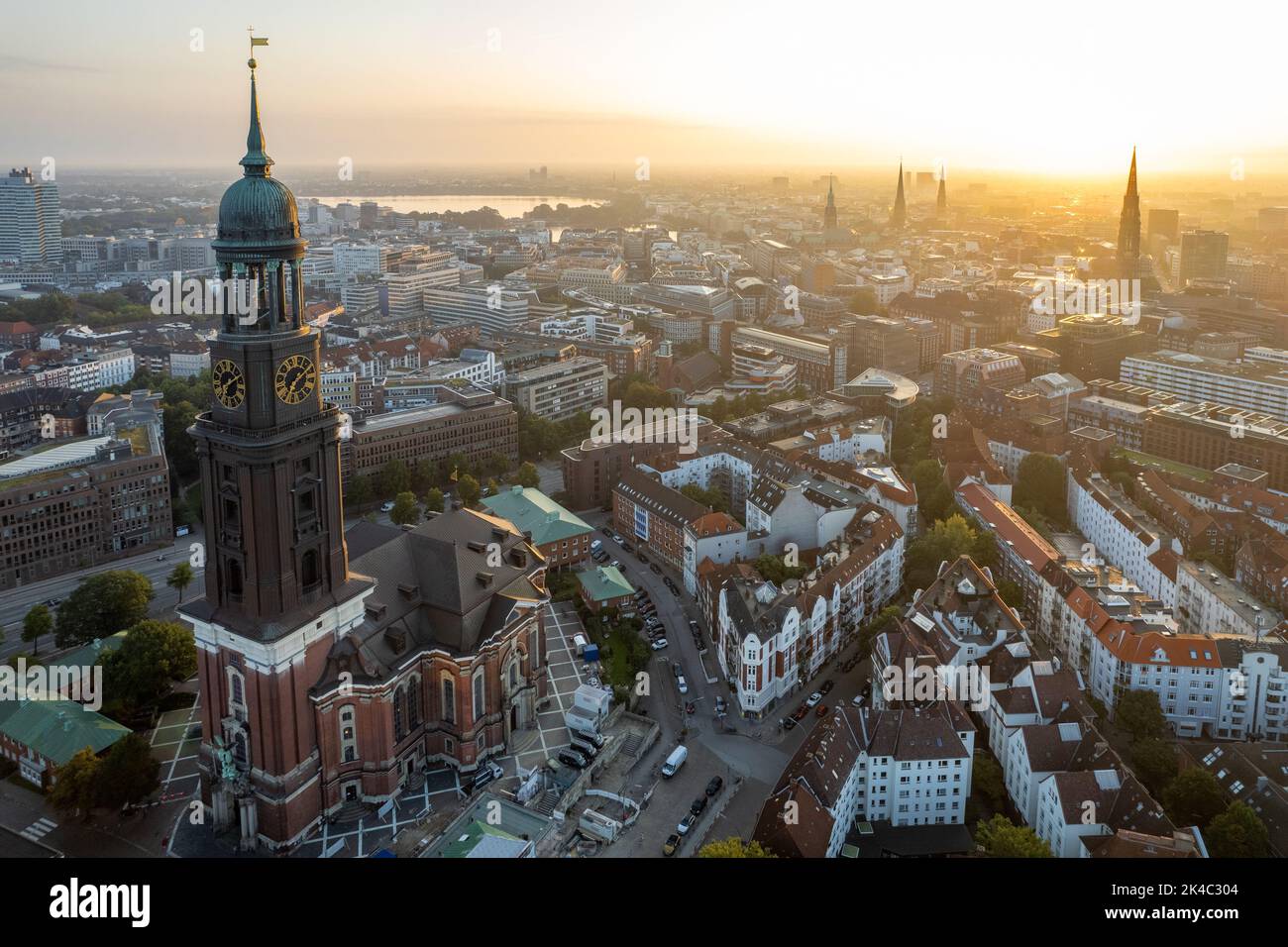 An aerial view of cityscape Hamburg surrounded by buildings during ...