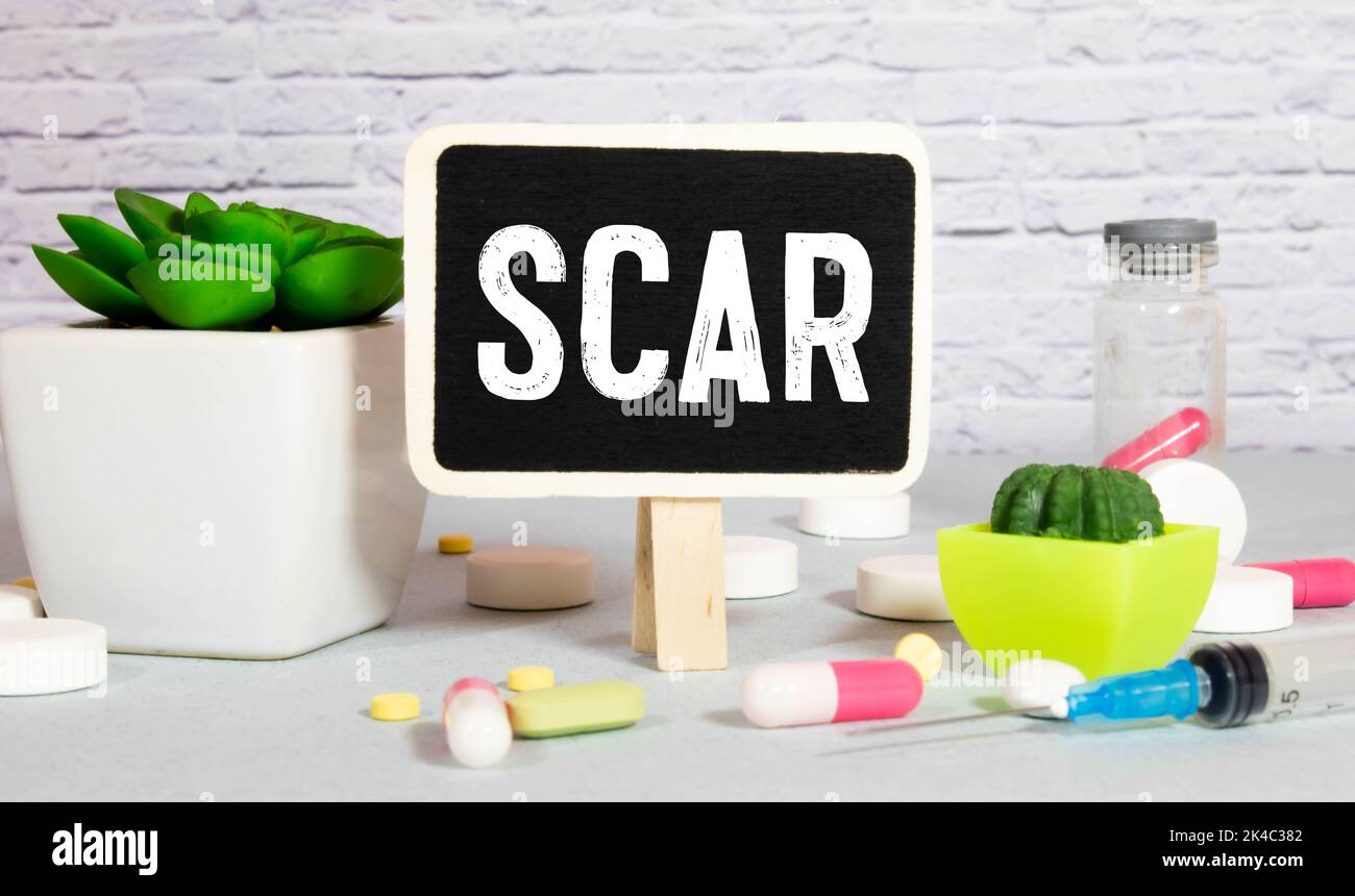 word scar spelled on dice Stock Photo - Alamy