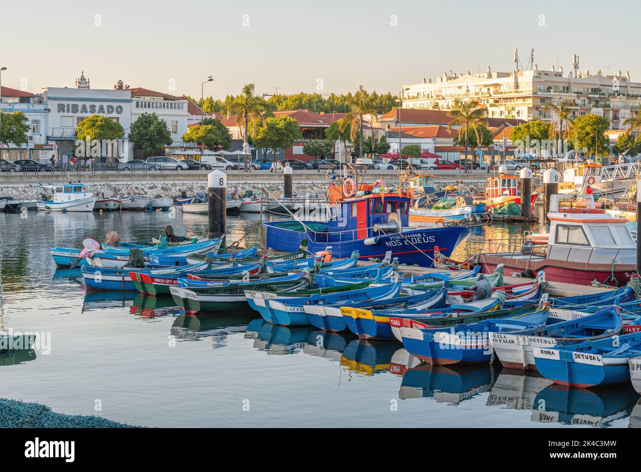An aerial view fishing port in background of buildings in Setubal Stock ...