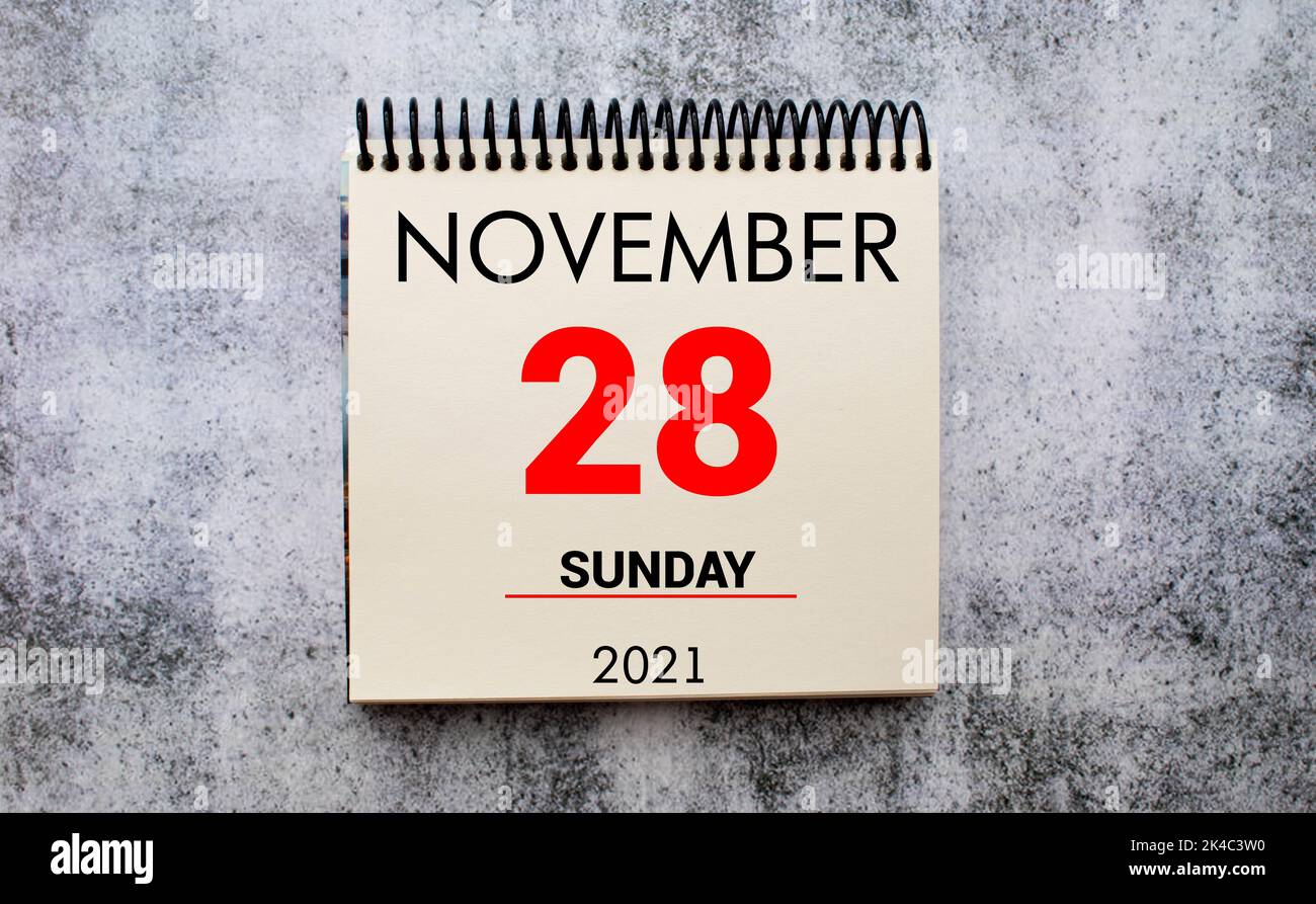 Save the Date written on a calendar - November 28 Stock Photo - Alamy