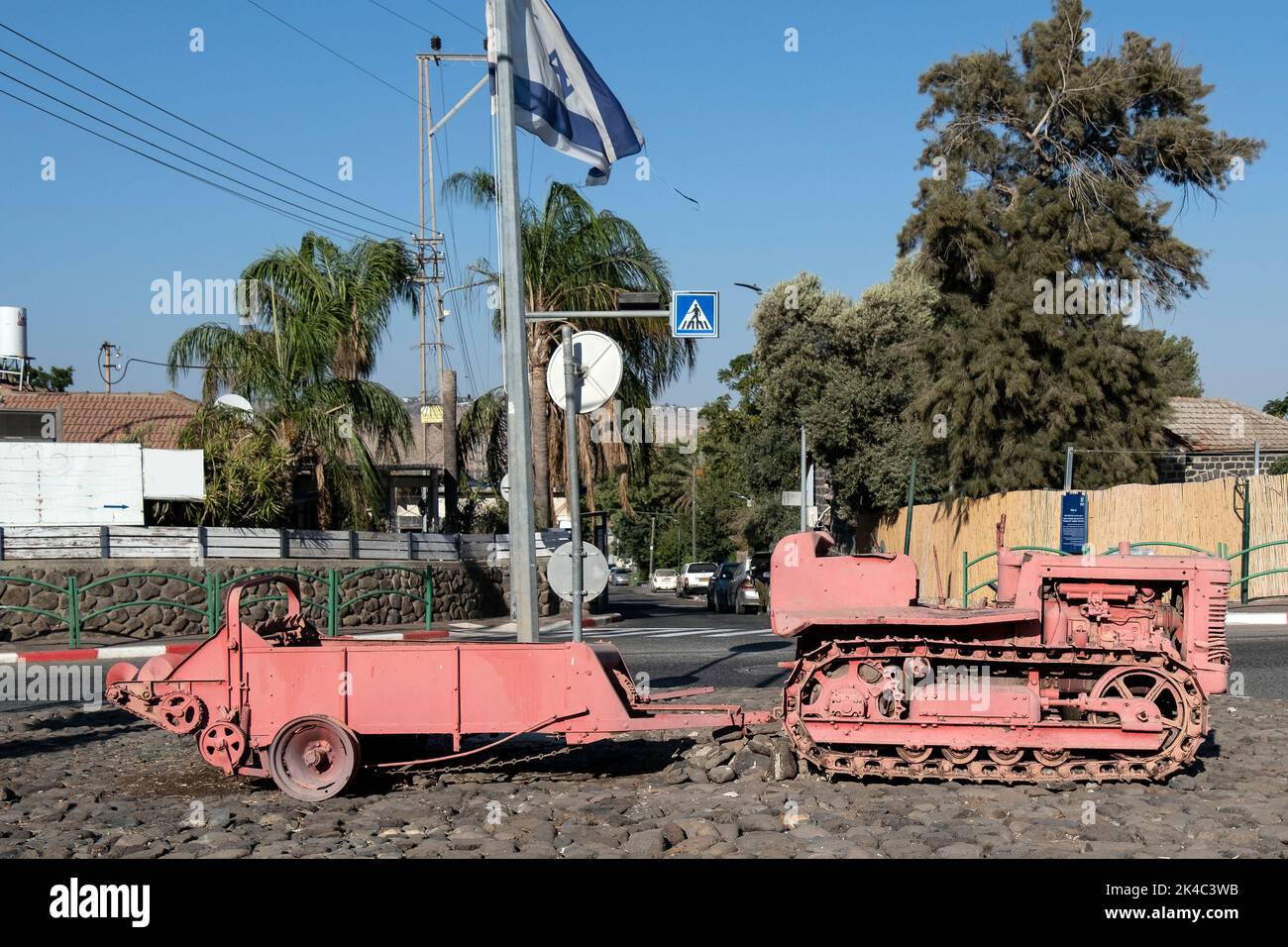 Old tractor and trailer used as symbolic monument to the agricultural ...